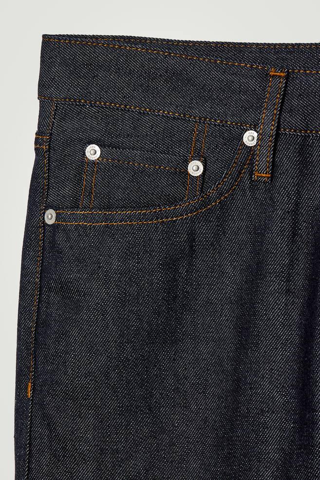 MARGIN RAW SELVEDGE TAPERED JEANS - INDIGO - Men | H&M GB