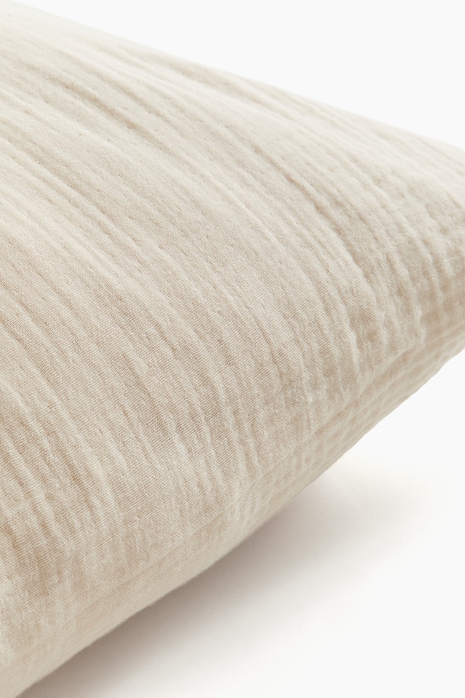 Light beige Cotton Muslin Pillowcase at H&M Home | H&M US