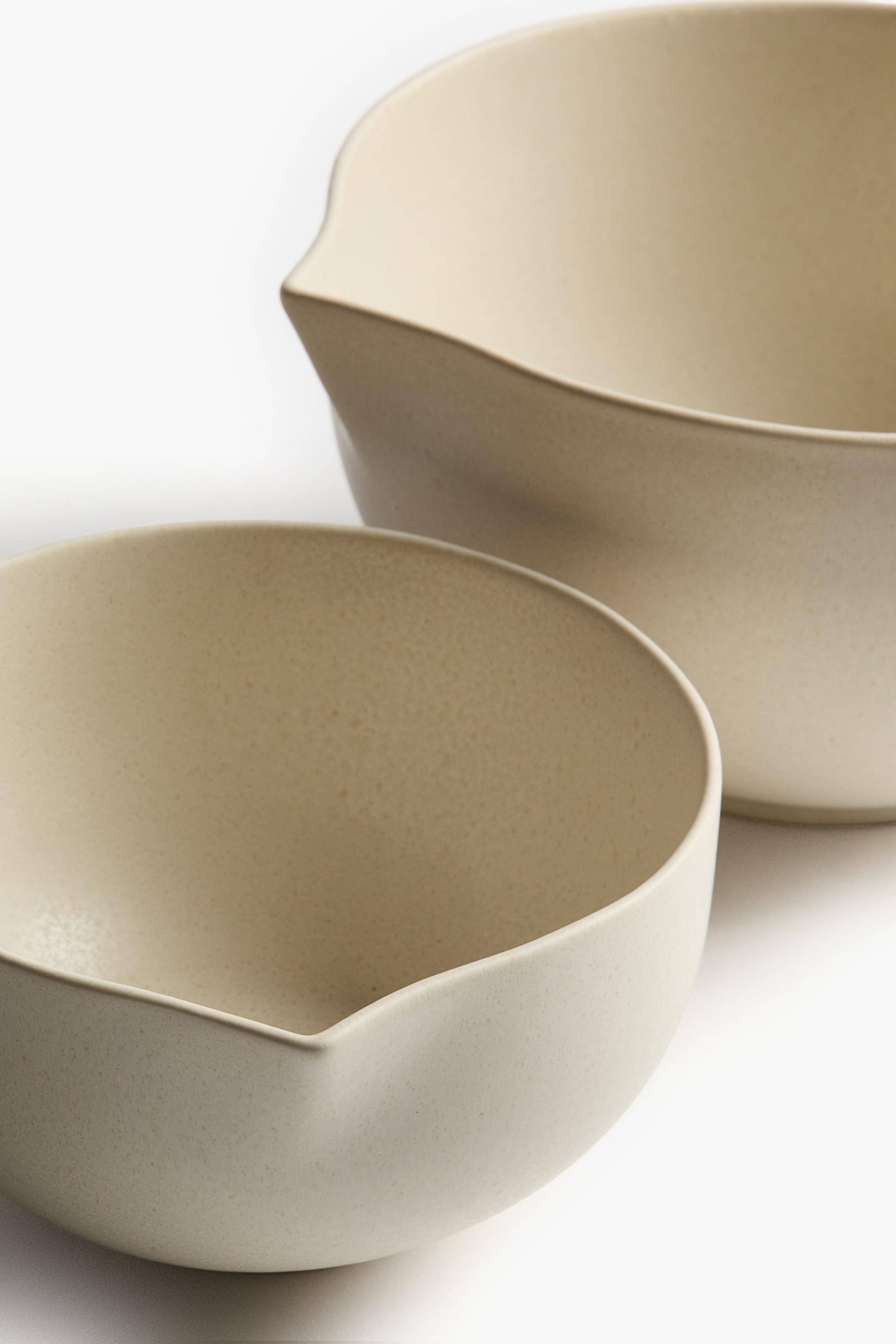 Light beige 2-pack reactive-glaze mixing bowls at H&M Home | H&M IN