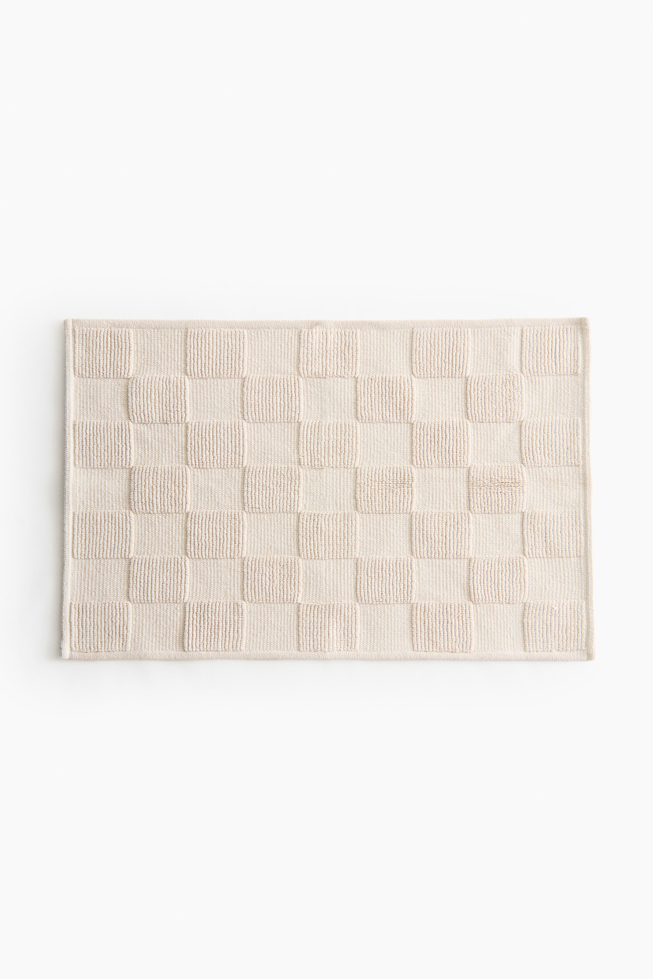 Light beige Checked bath mat at H&M Home | H&M IN