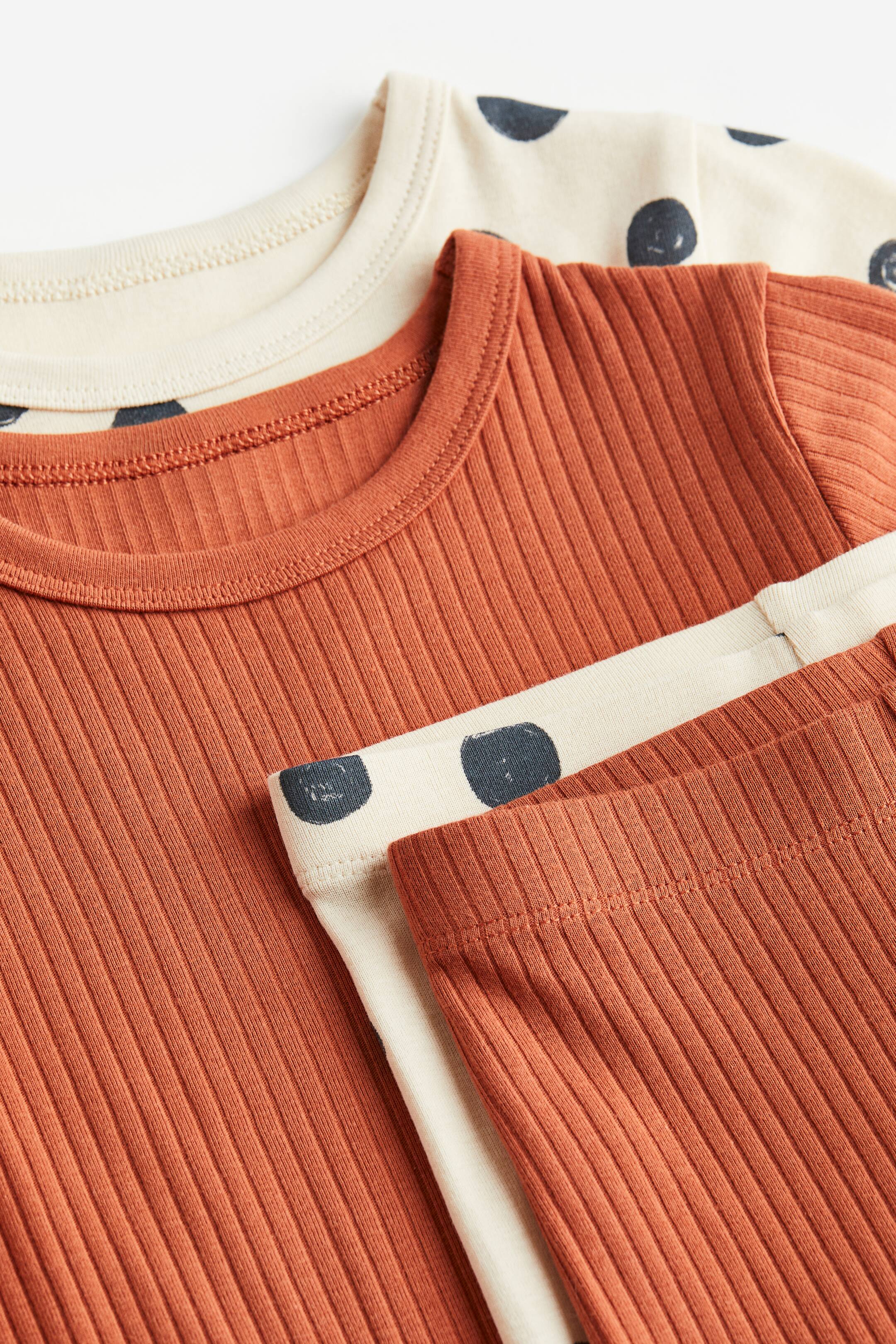 2-pack cotton pyjamas - Light beige/Spotted - Kids | H&M IE