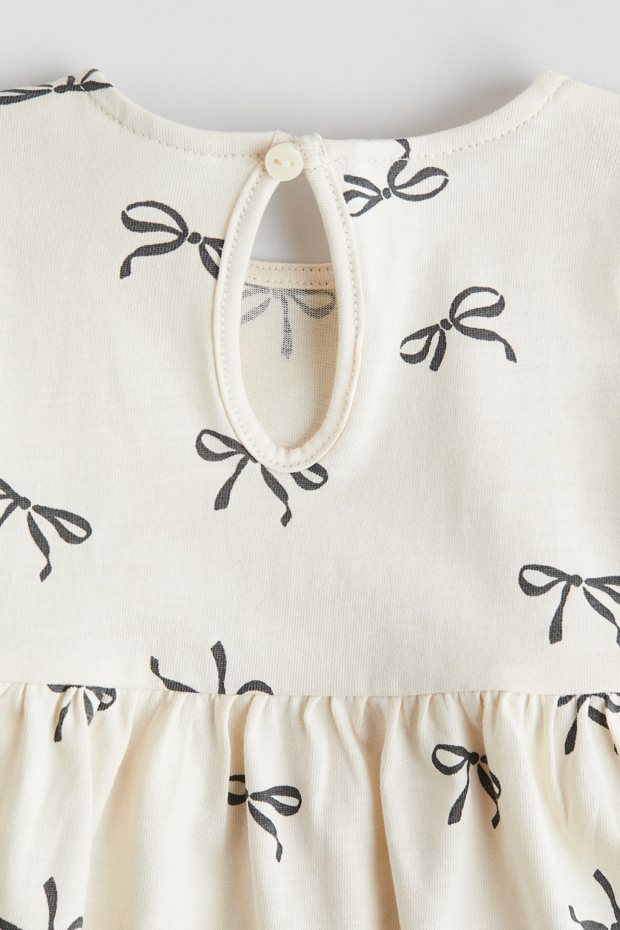 Ruffle-Trimmed Cotton Dress - Cream/bows - Kids | H&M US