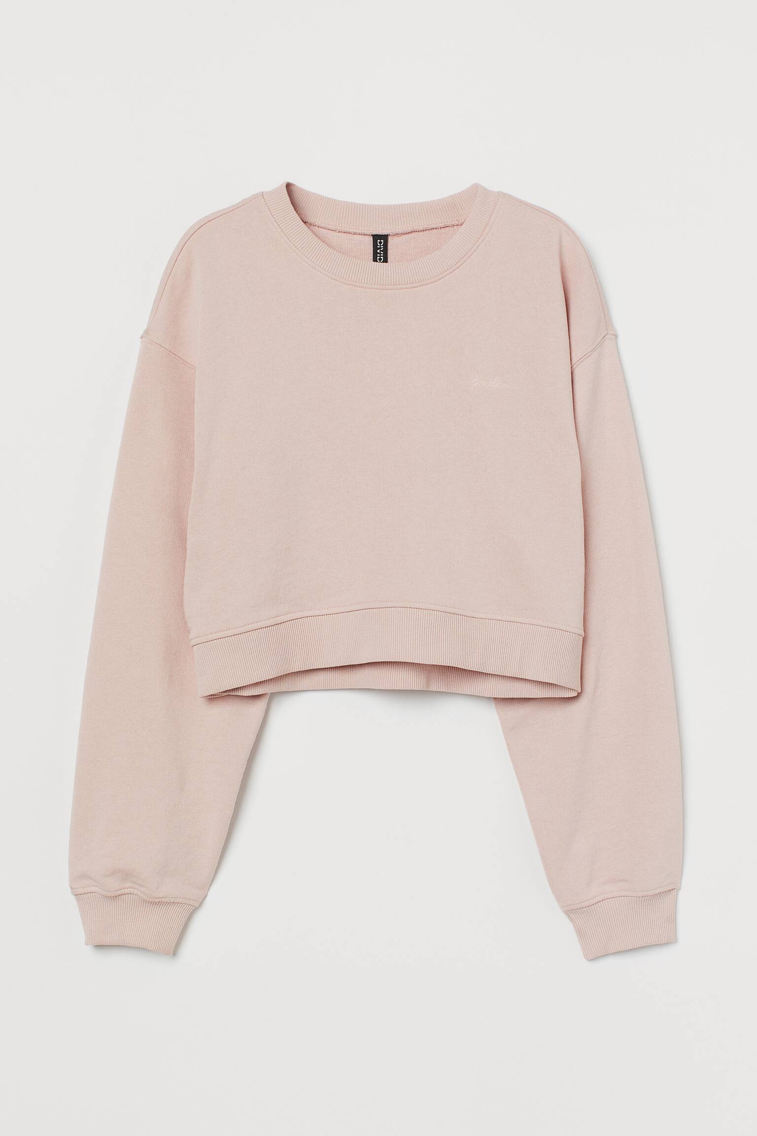 סווטשירט קרופ - ורוד פודרה בהיר/Smile - Ladies | H&M IL