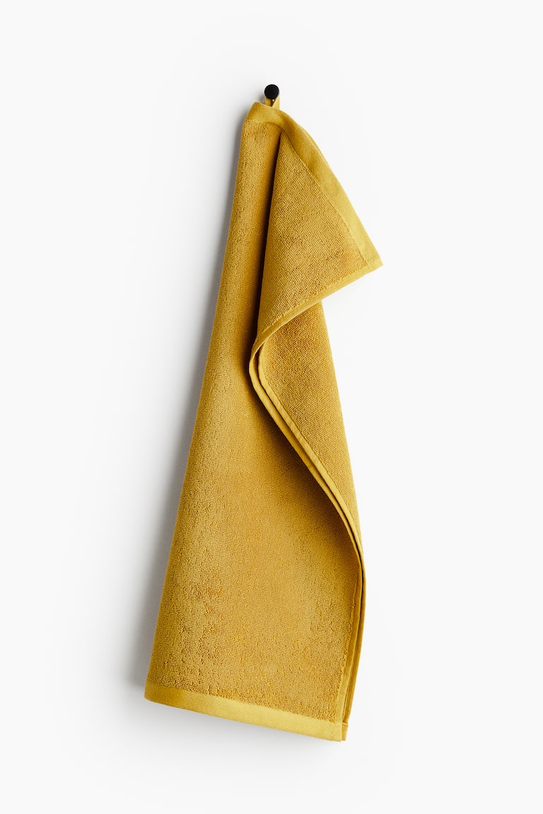 Yellow Terry hand towel at H&M Home | H&M GB
