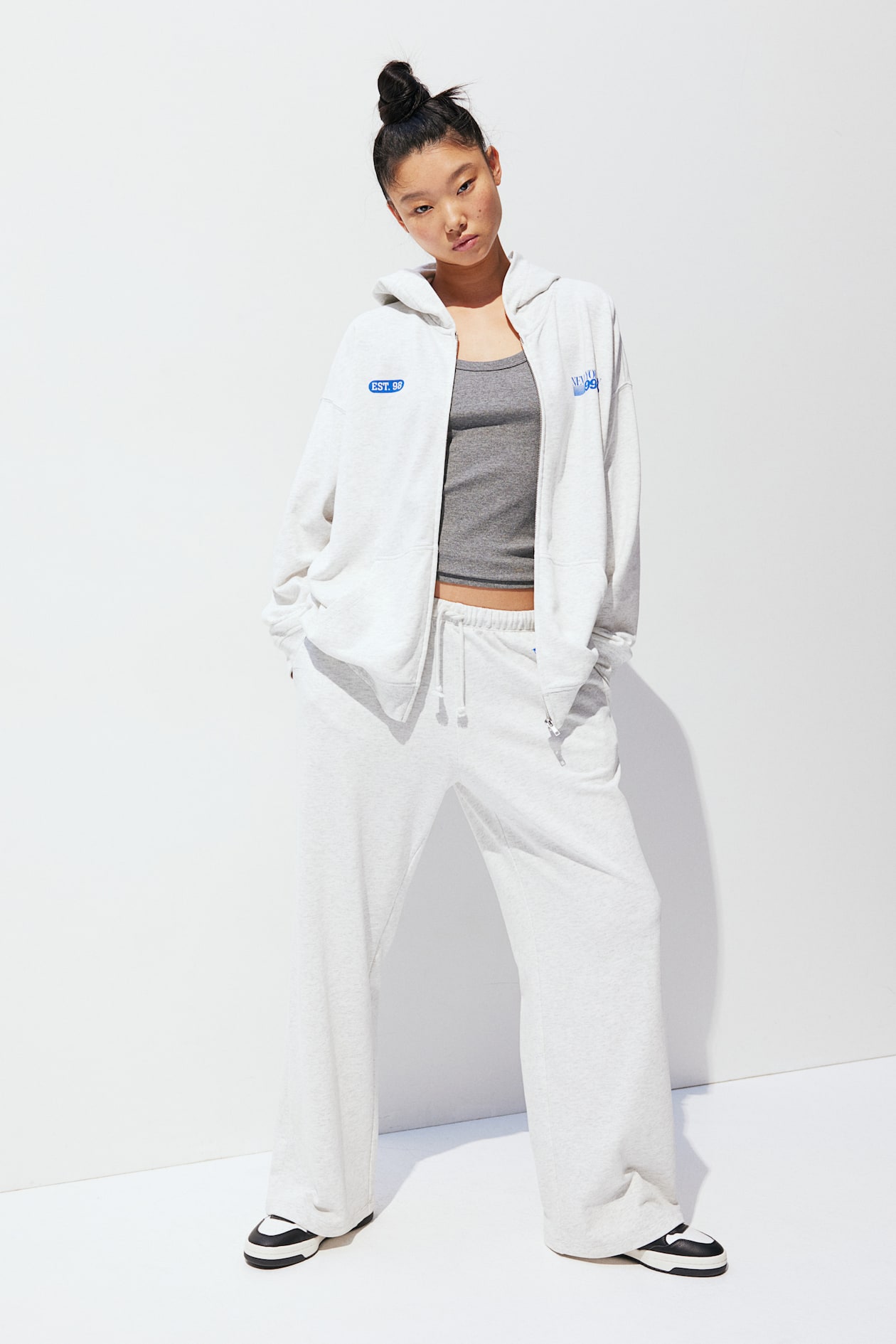 Wide motif-detail joggers - Light grey marl/NYC - Ladies | H&M IN