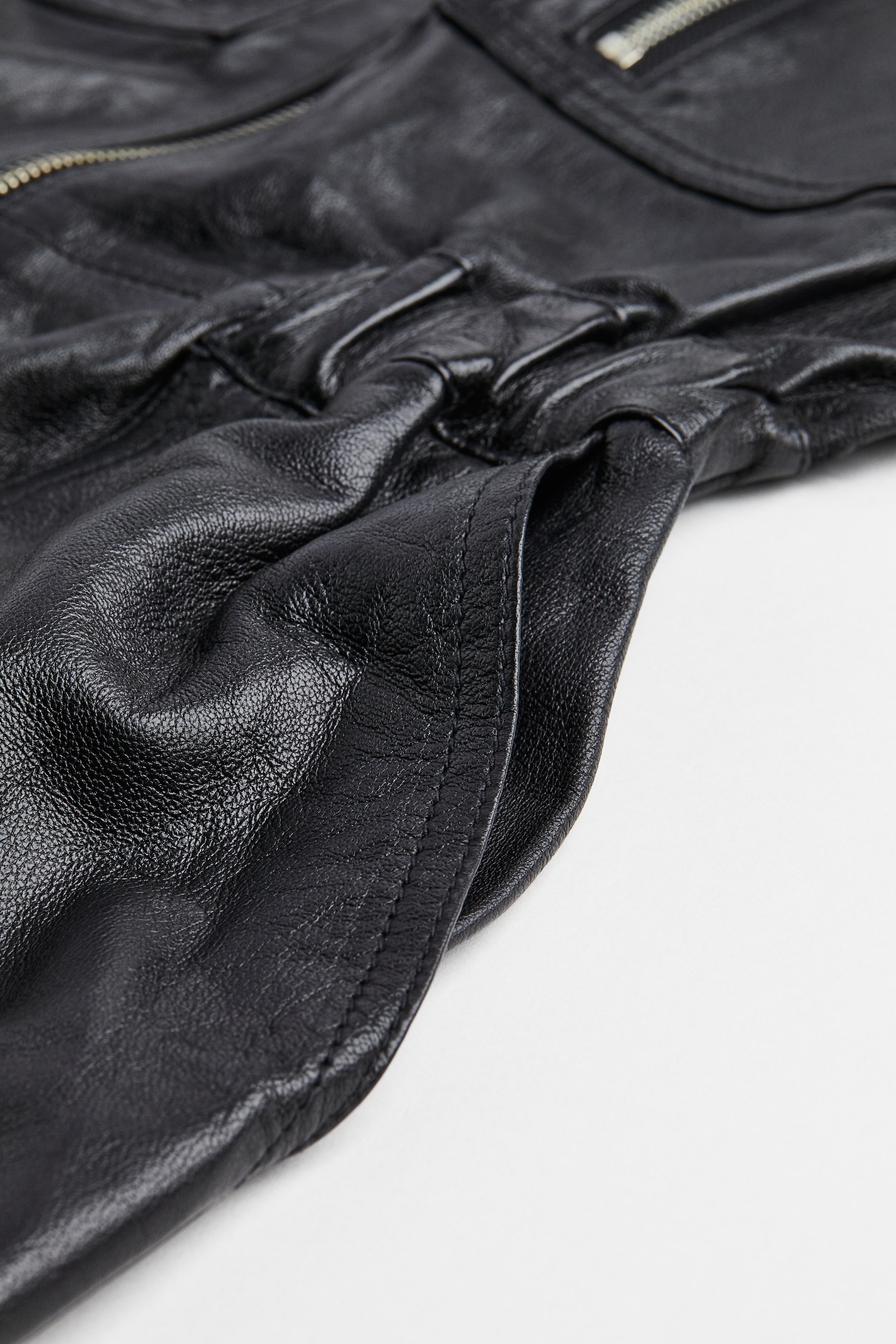 Jumpsuit aus Leder mit Zipdetail - Langarm - Lang - Schwarz - Ladies | H&M AT