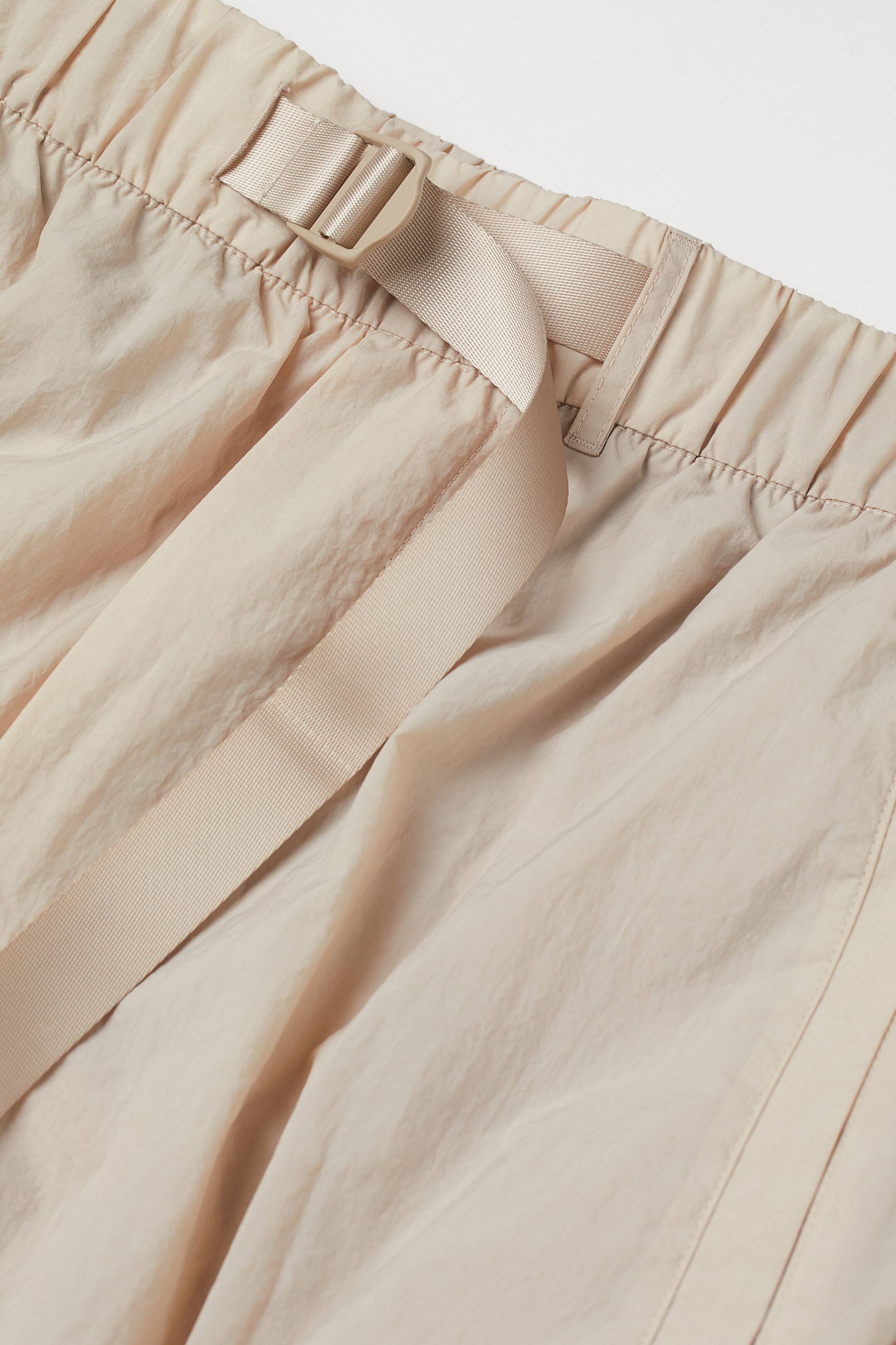 Recycled nylon trousers - Light greige - Men | H&M IE