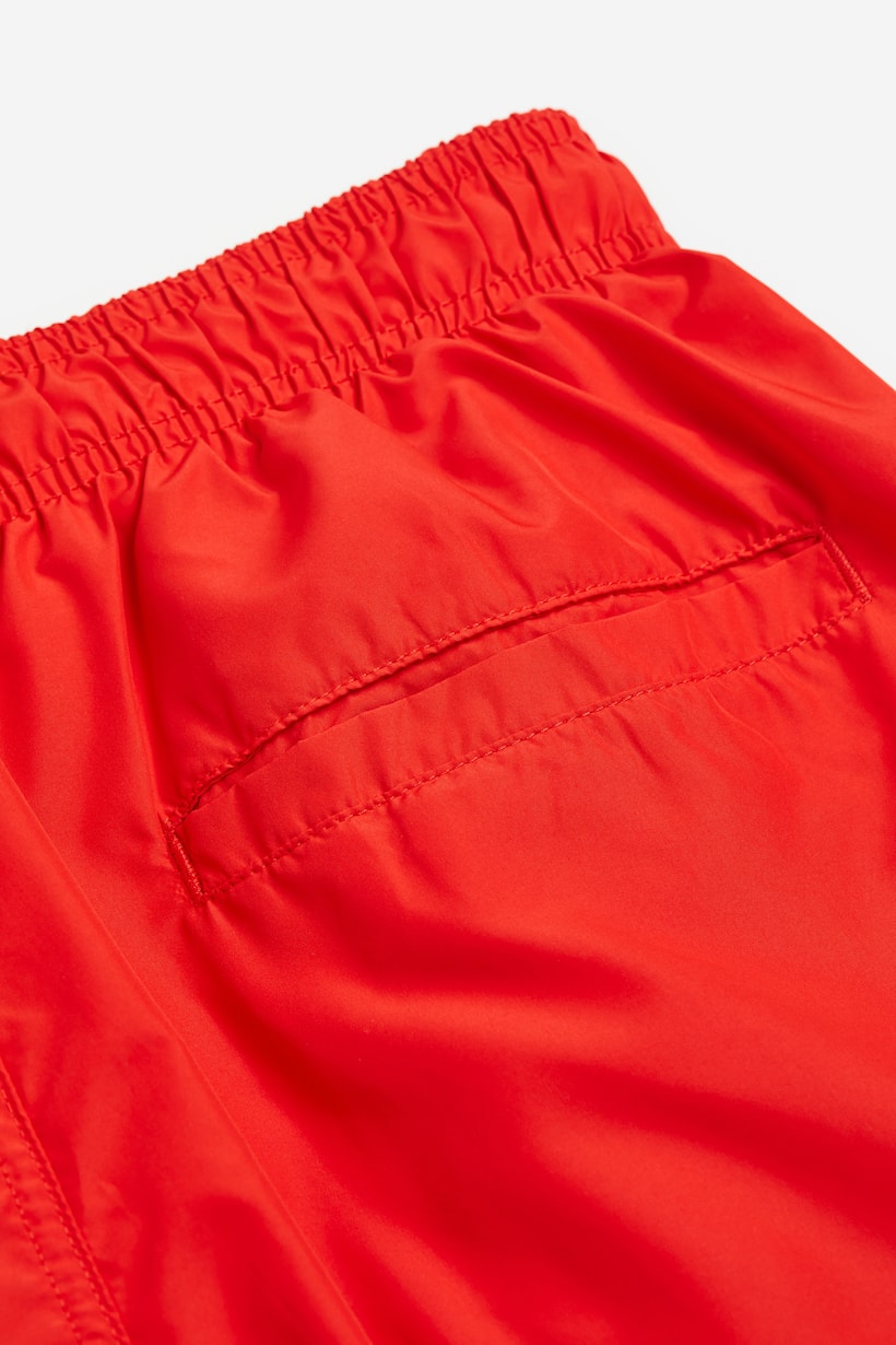 Swim Shorts - Bright red - Men | H&M US