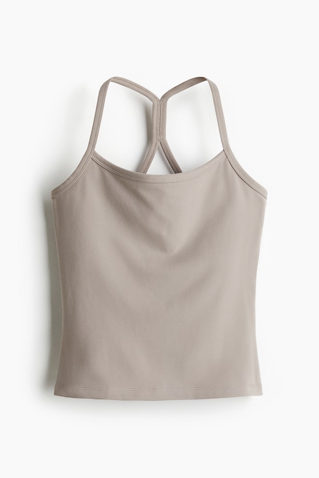 Integral-bra sports strappy top with SoftMove™ - Greige - Ladies | H&M GB