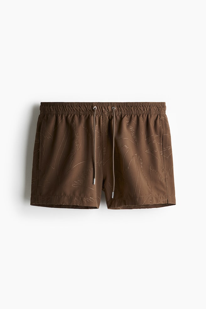 Men’s Dark brown Embroidered-Pattern Swim Shorts | H&M US