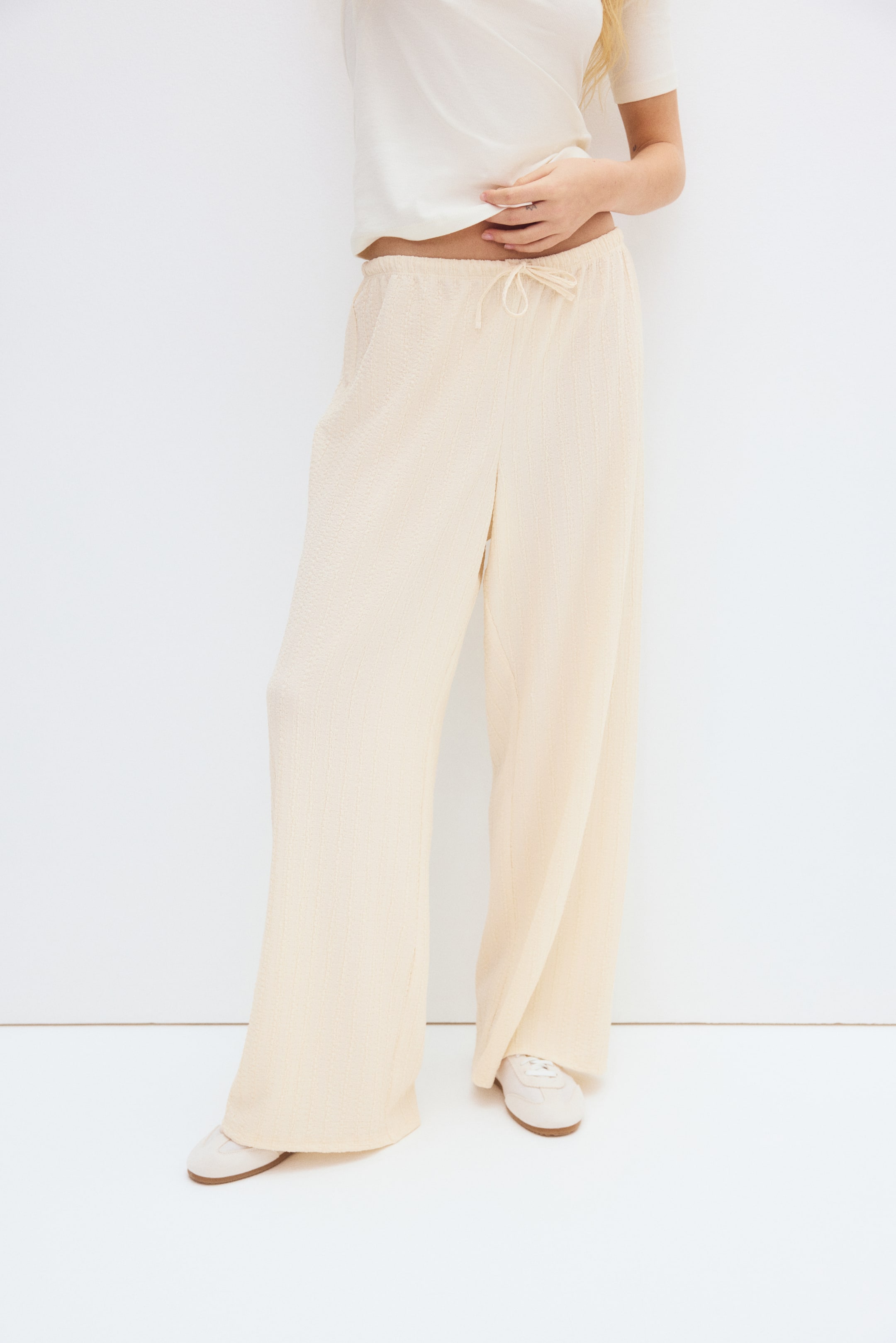 Textured jersey drawstring trousers - Light beige - Ladies | H&M SG