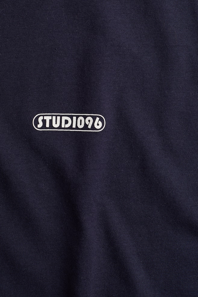 Oversized T-shirt - Navy blue/Studio 96 - Ladies | H&M US