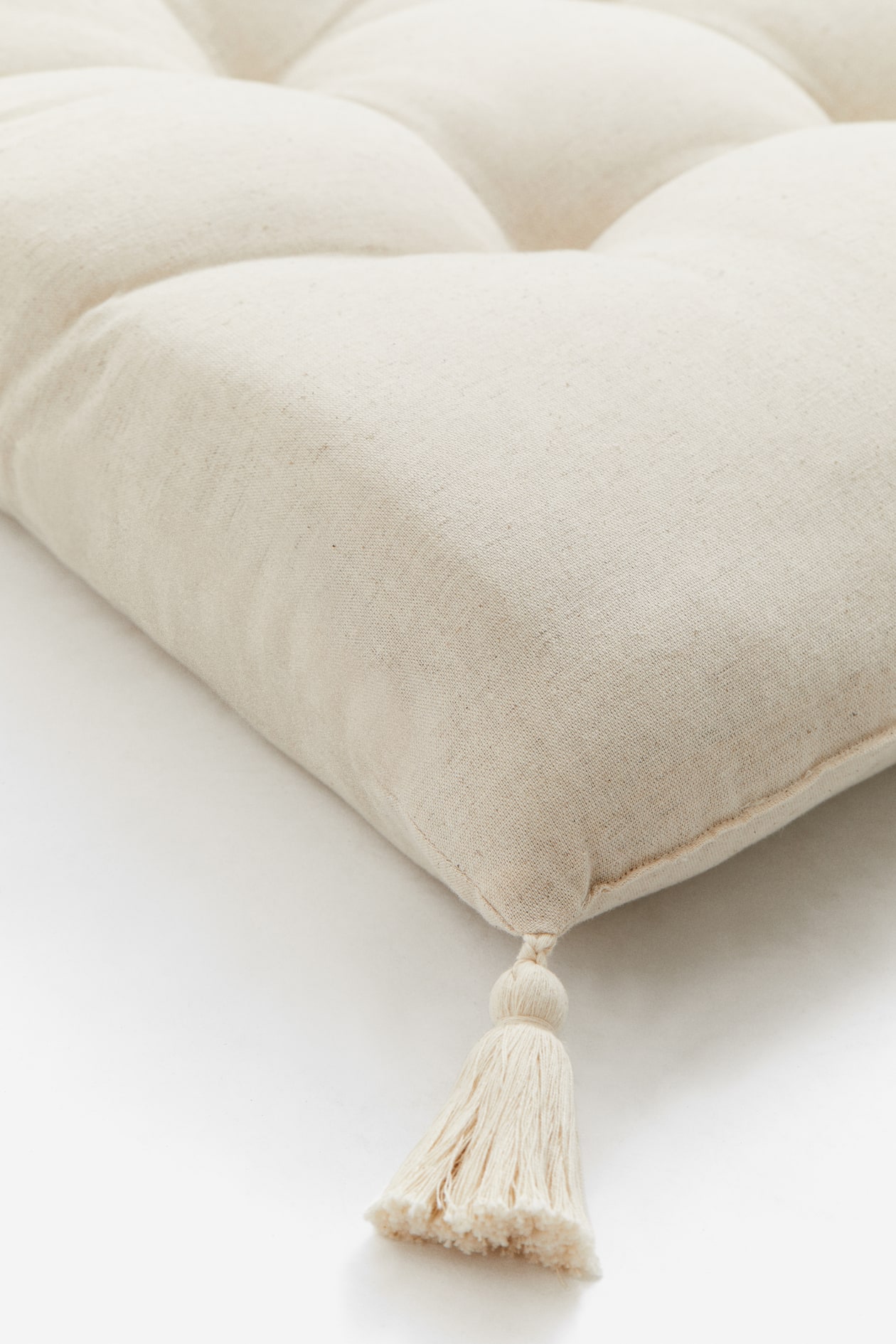 Light beige Rectangular tasselled cushion at H&M Home | H&M GB
