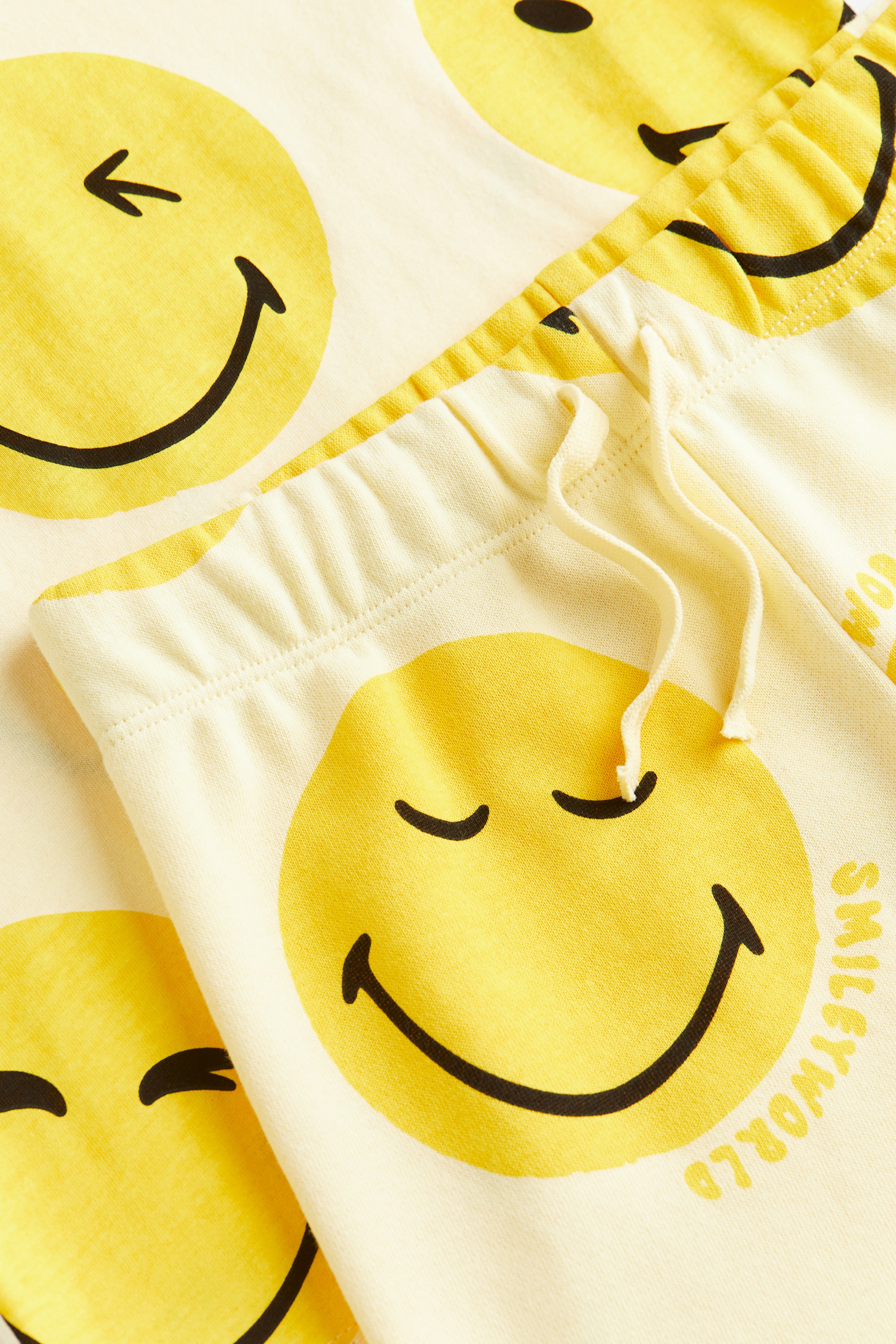 2-piece printed set - Light yellow/SmileyWorld® - Kids | H&M PH