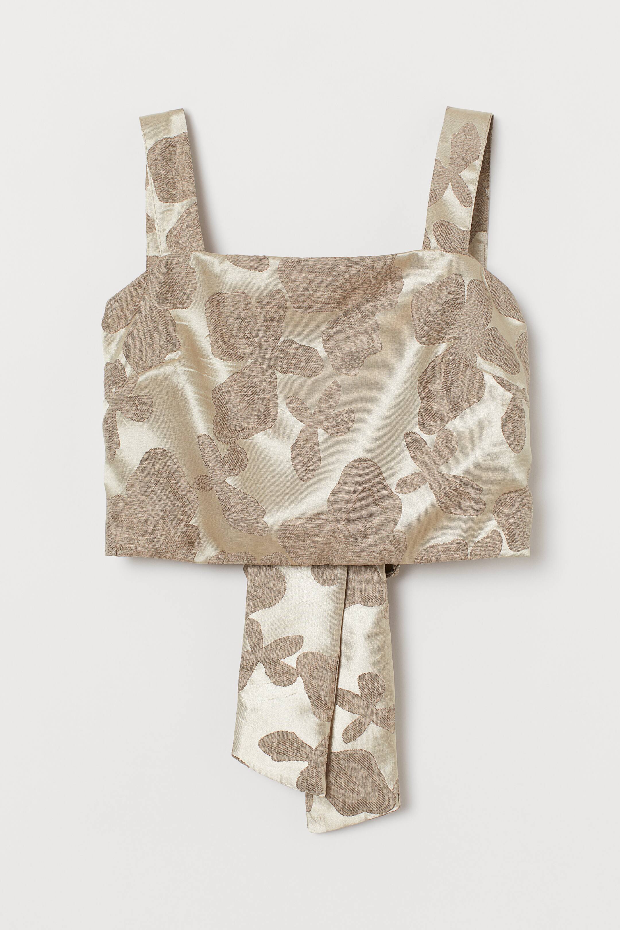 Cropped top with a bow - Ärmlös - Kort - Guld/Ljus mullvad - DAM | H&M SE