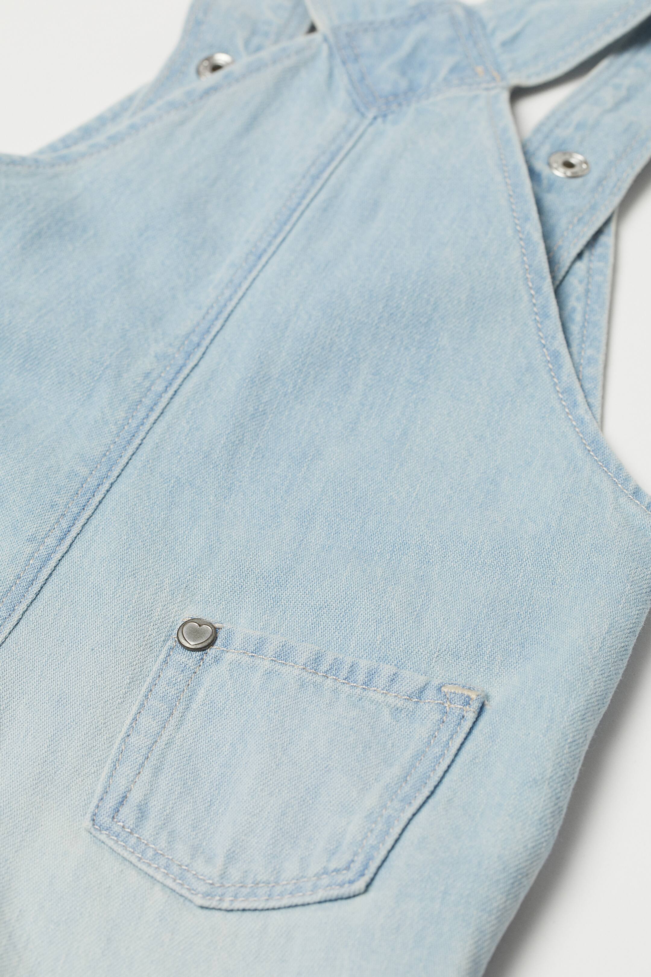 Overol de shorts en algodón - Azul denim claro/Gato - Kids | H&M MX