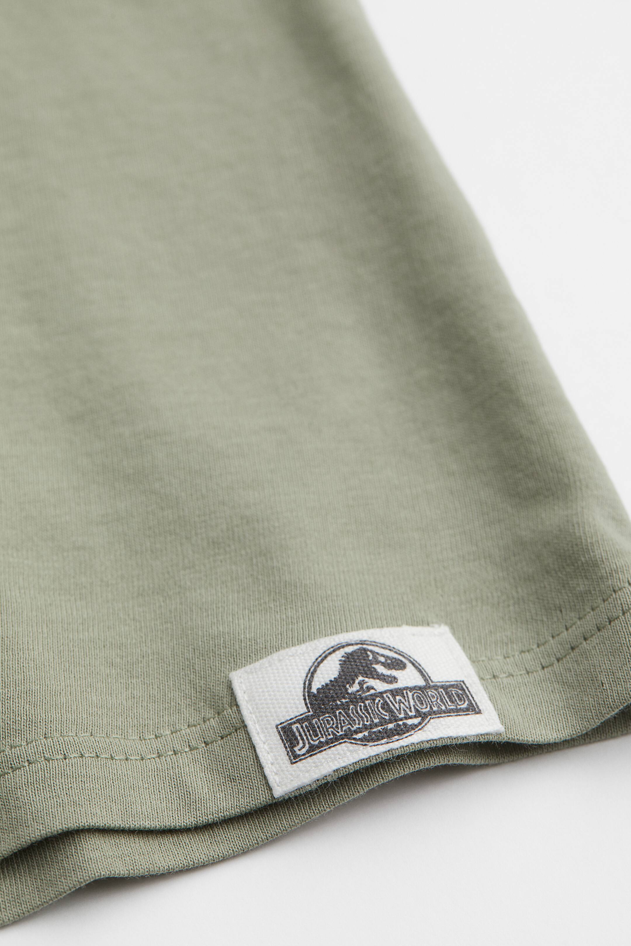 Playera con diseño estampado - Verde caqui/Jurassic World - Kids | H&M MX