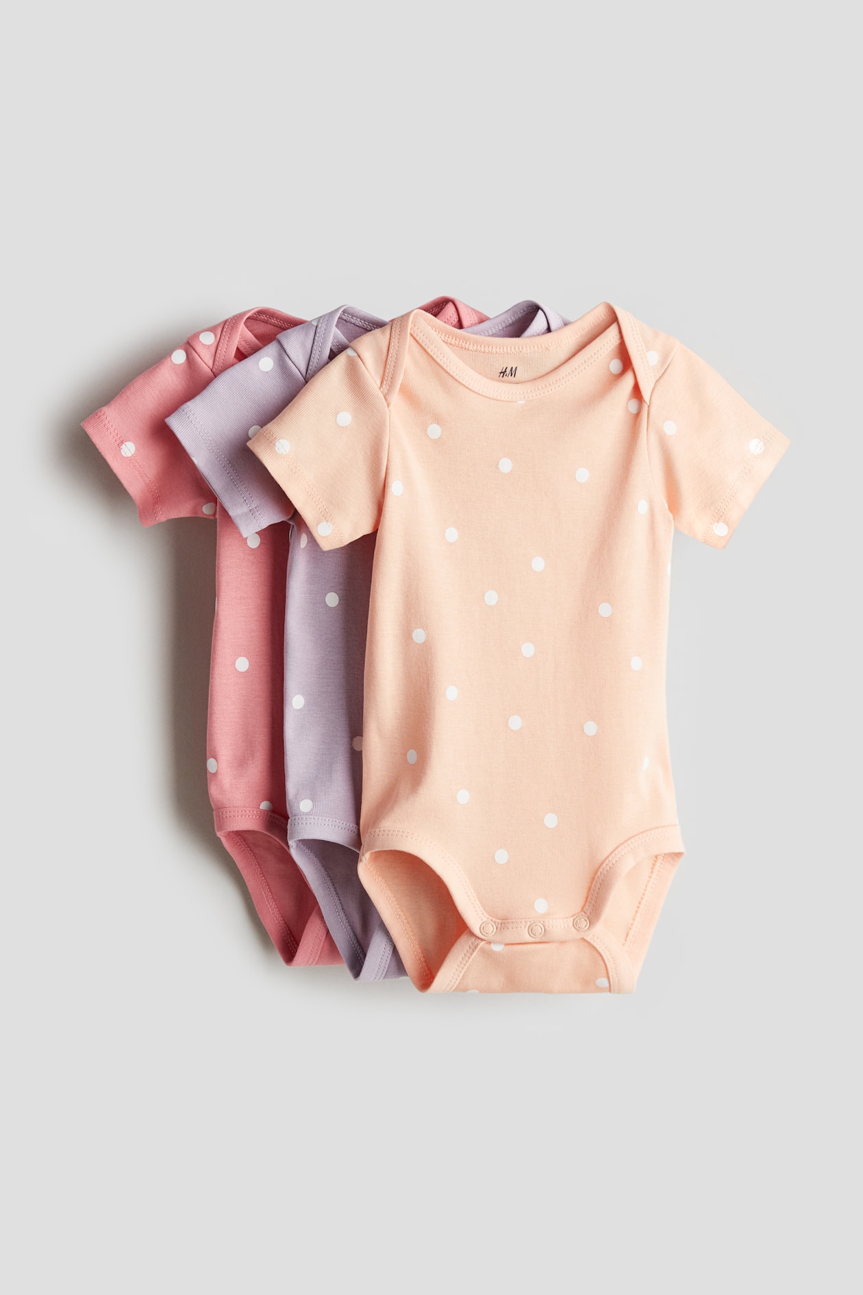 3-pack cotton bodysuits - Light orange/Spotted - Kids | H&M GB