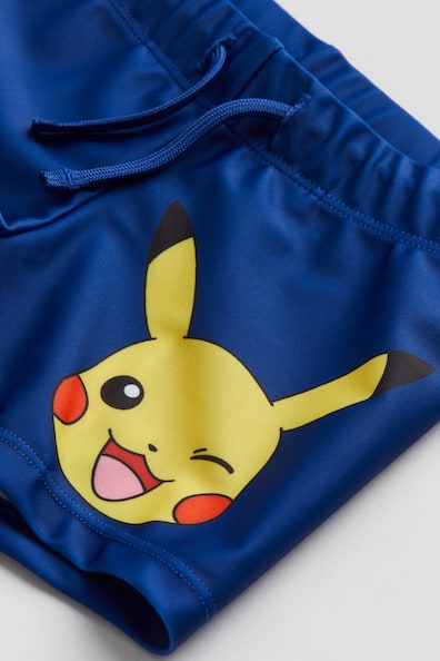 Dark blue/Pokémon Printed Swim Trunks for kids | H&M US
