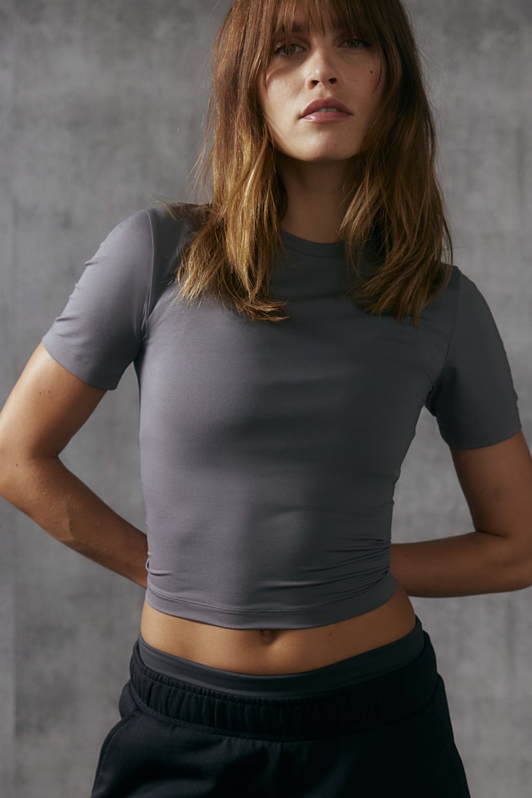 Sports Crop Top with DryMove™ - Dark gray - Ladies | H&M US
