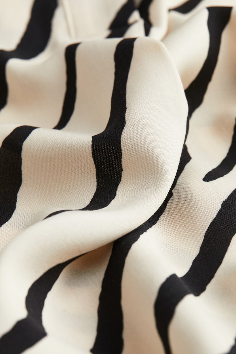 V-neck Tunic - Light beige/zebra print - Ladies | H&M US