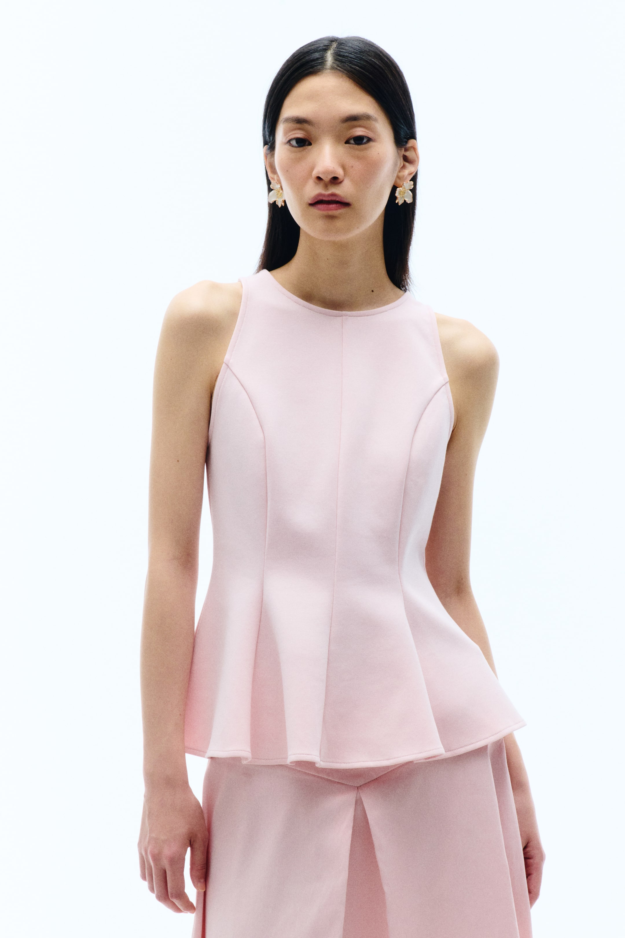 Sleeveless peplum top - Light pink - Ladies | H&M HK