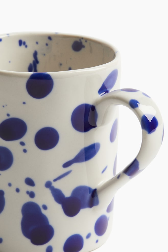 Natural white/dark blue Speckled-glaze Stoneware Mug at H&M Home | H&M US