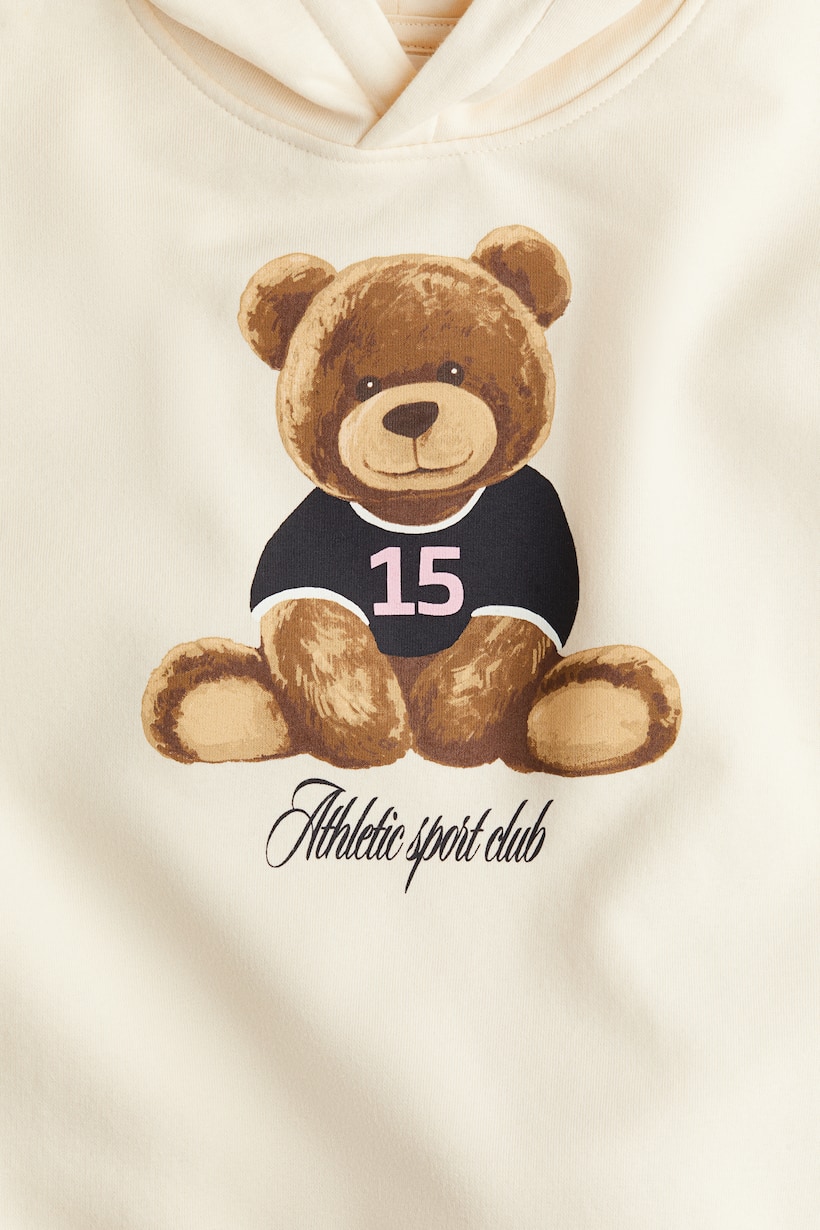 Light beige/Teddy bear Printed hoodie for kids | H&M GB