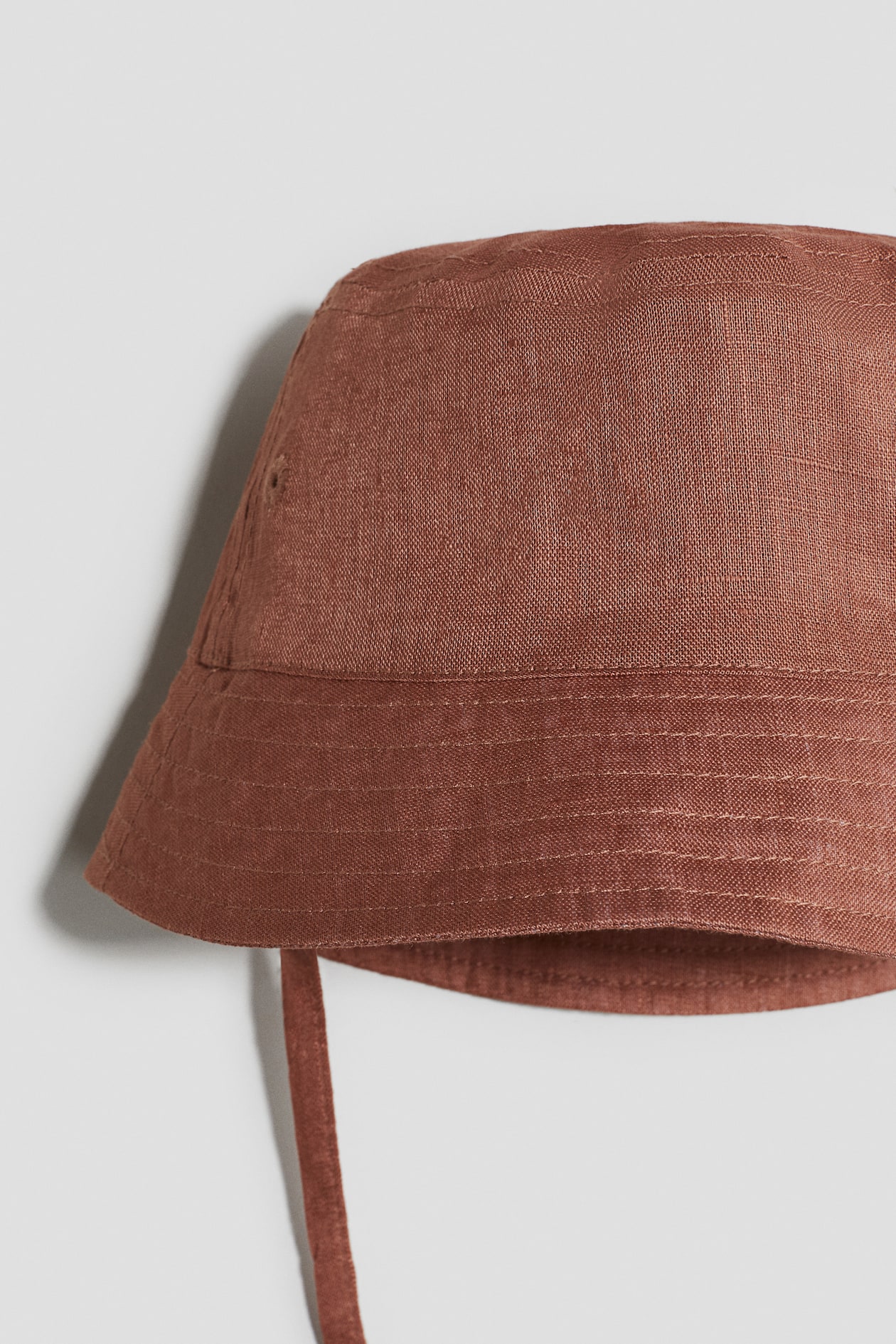 Gorro de lino para el sol - Marrón - NIÑOS | H&M ES