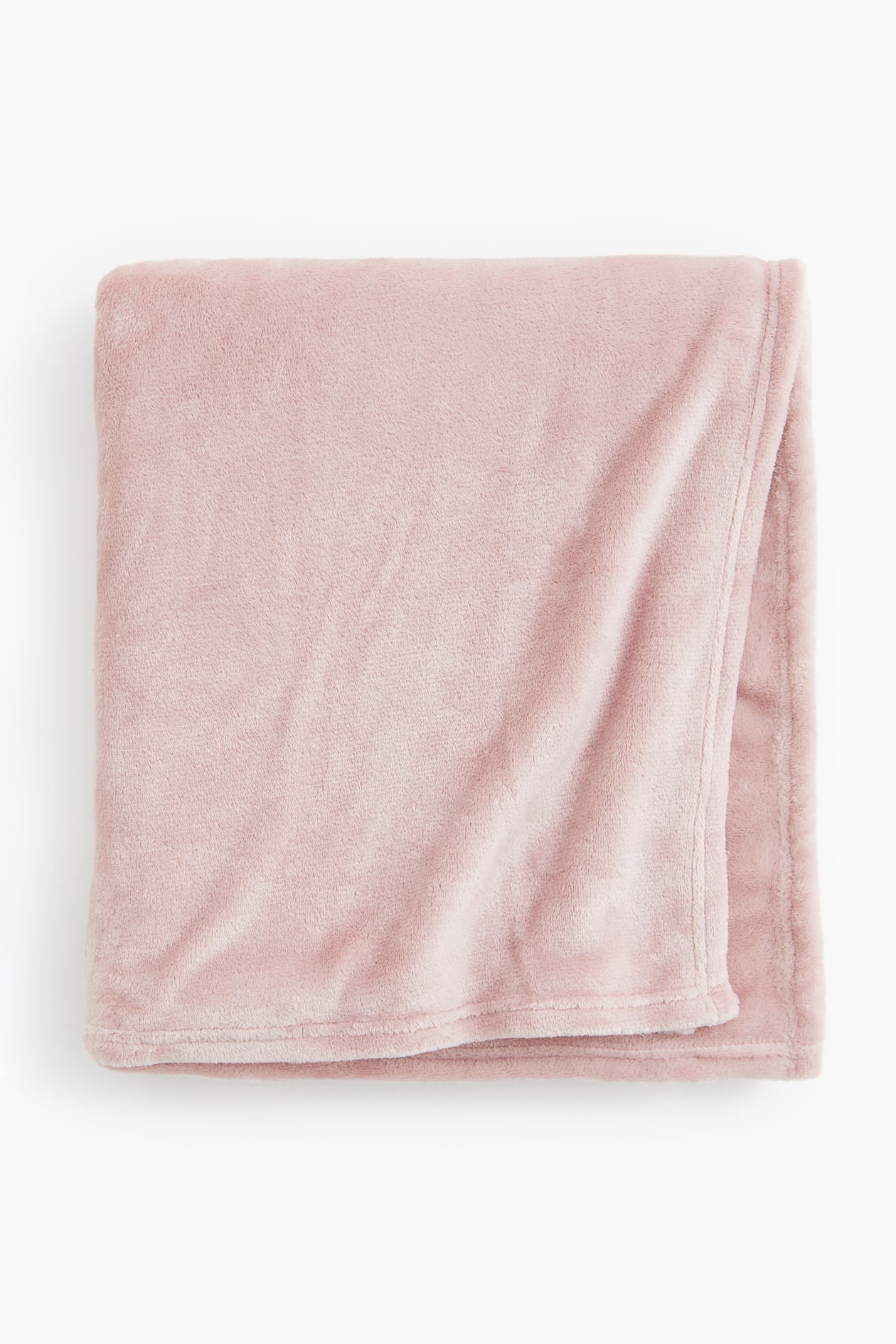 Light pink Fleece blanket at H&M Home | H&M GB