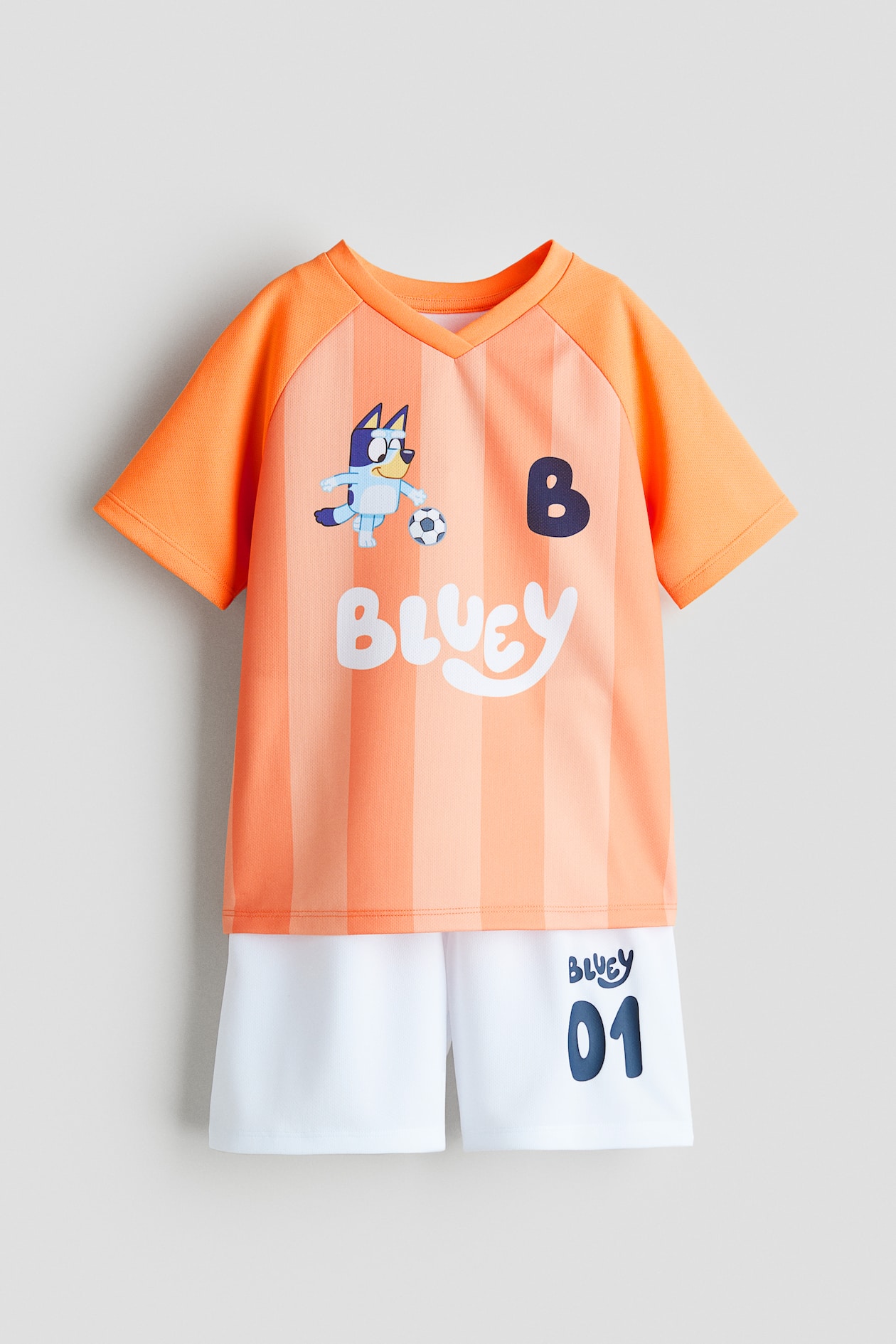 - 2-piece football set - Orange/Bluey - Kids | H&M SG