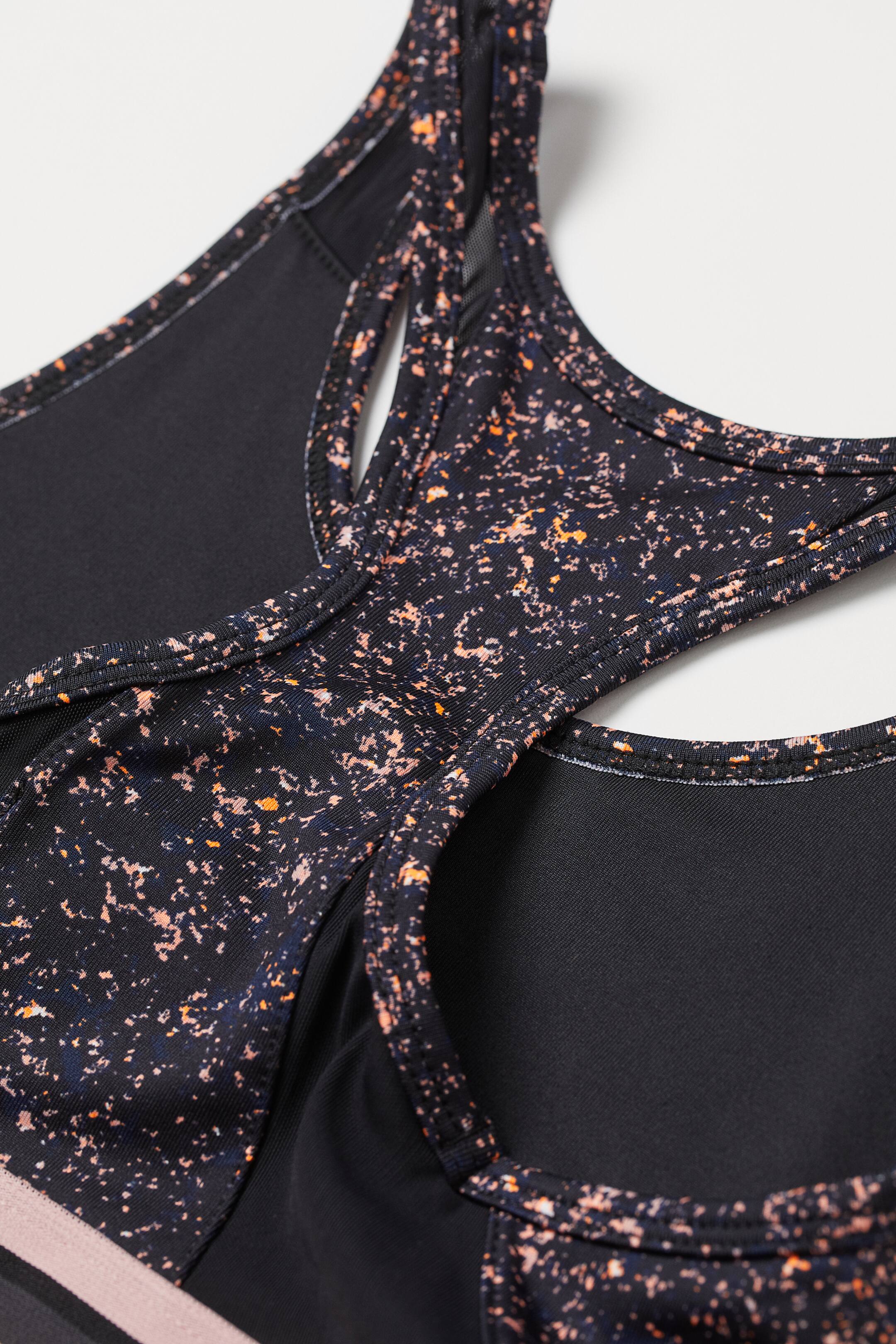 Sports bra Medium support - Black/Pink patterned - Ladies | H&M GR