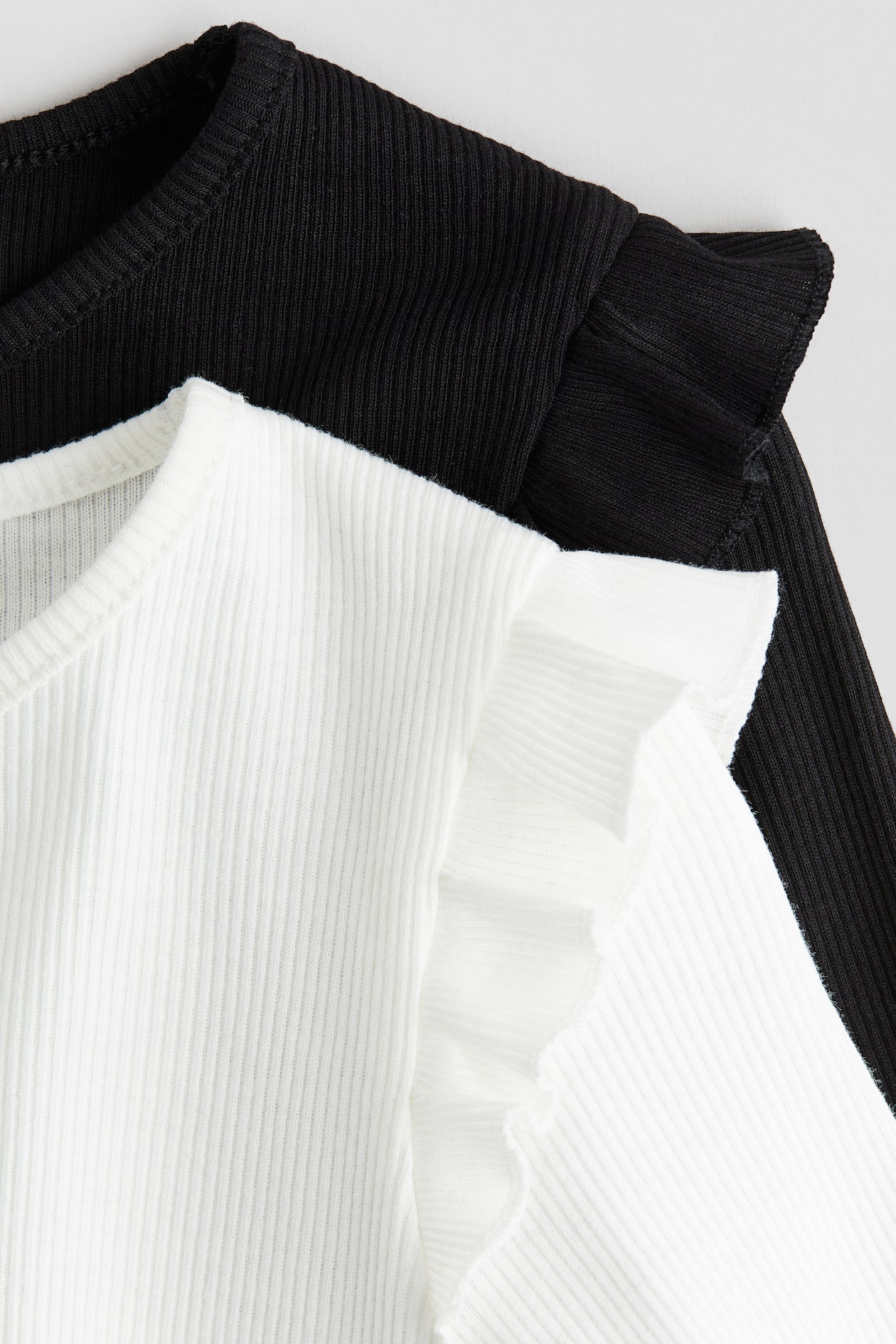 2-pack ribbed cotton tops - White/Black - Kids | H&M GB