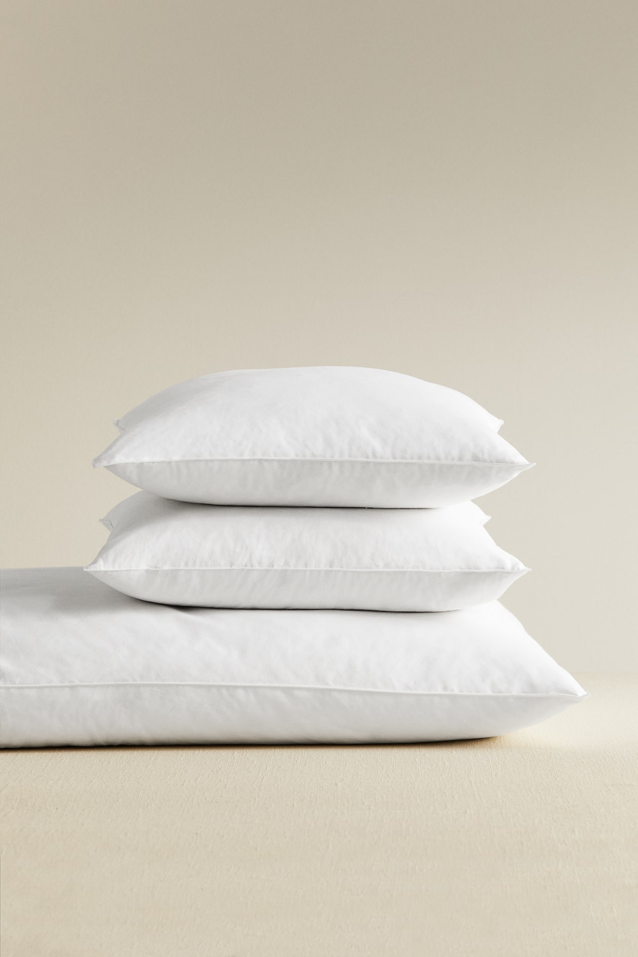 White Feather-filled Inner Cushion at H&M Home | H&M CA