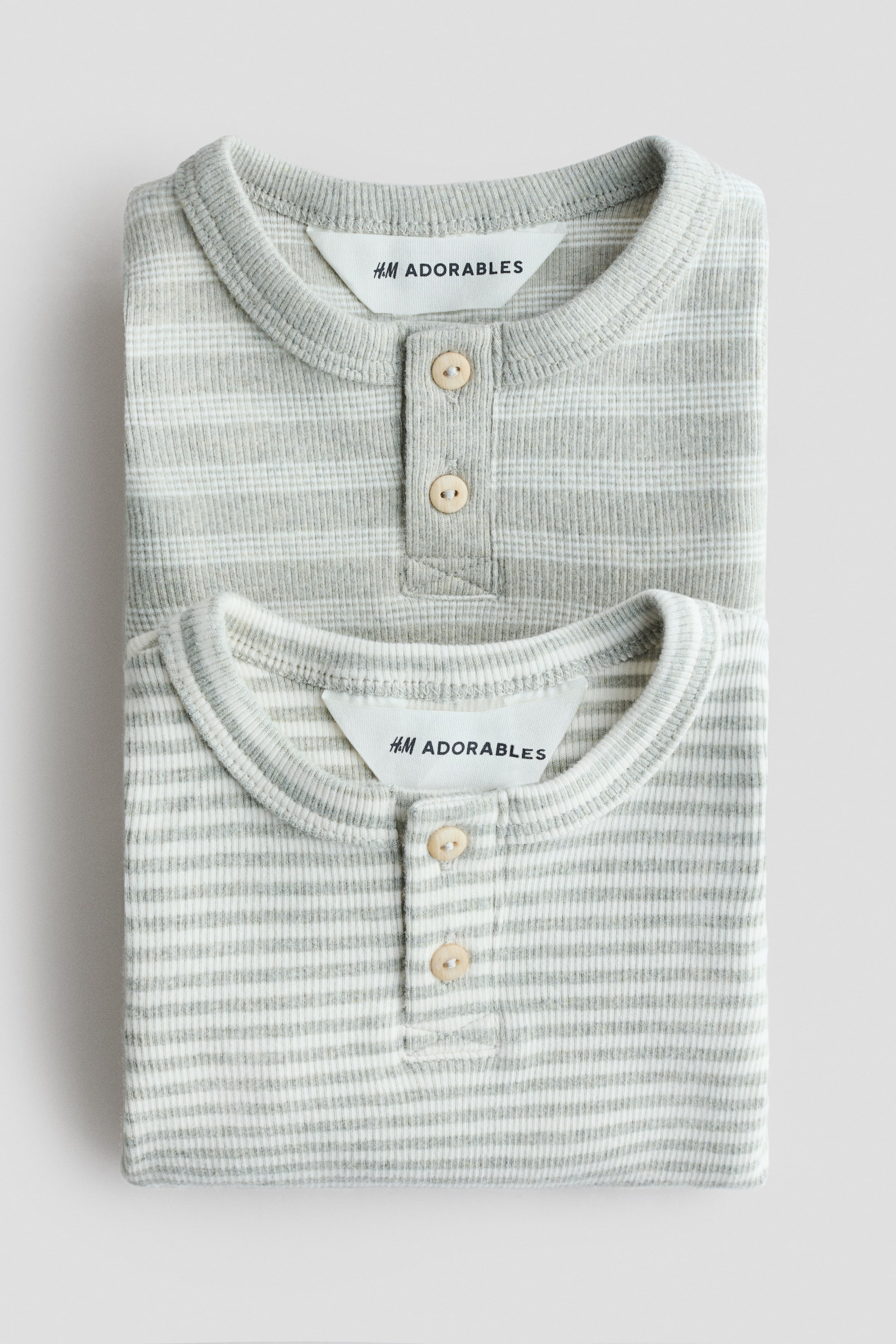 Light dusty green/Striped 2-pack Henley bodysuits for kids | H&M GB