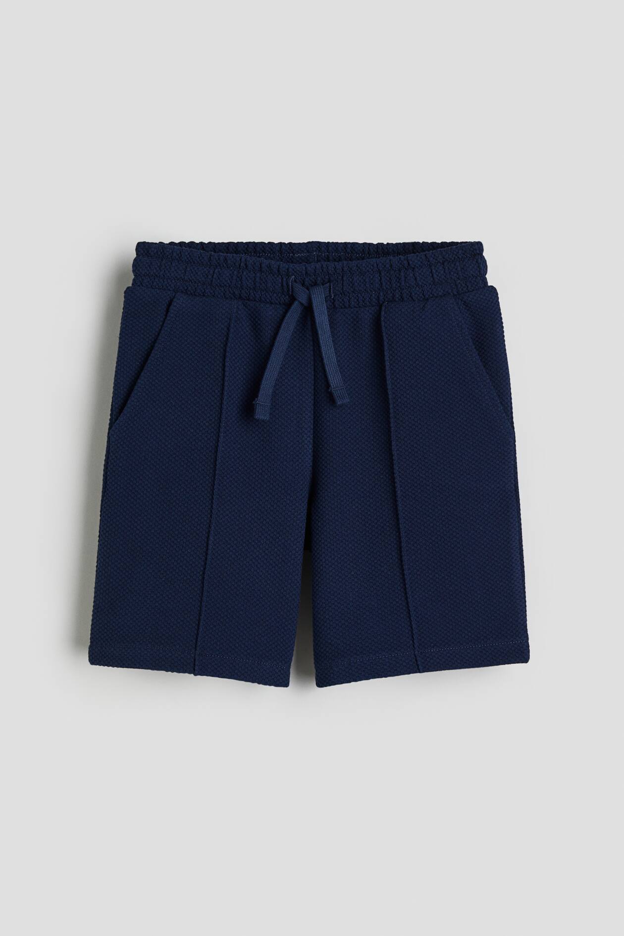 Crease-leg jersey shorts - Navy blue - Kids | H&M MY