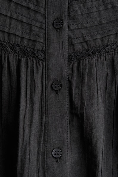 Blusa de algodón con cuello de olán - Negro - Ladies | H&M MX