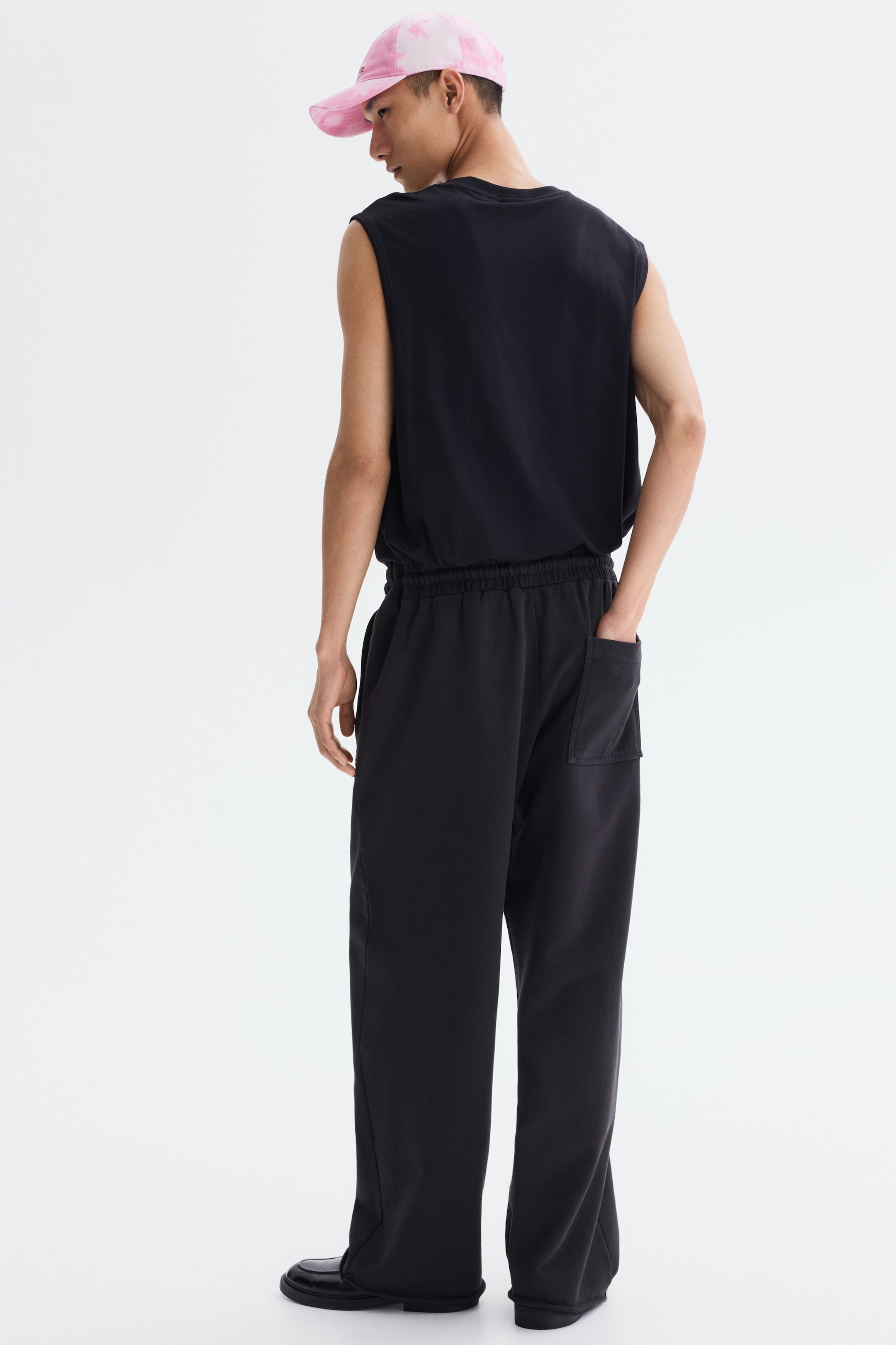 Relaxed Fit Cotton joggers - Black/No Love Just Fire - Men | H&M IN