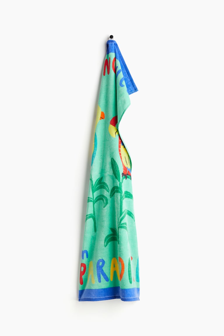 Turquoise/Paradise Patterned Bath Towel at H&M Home | H&M US