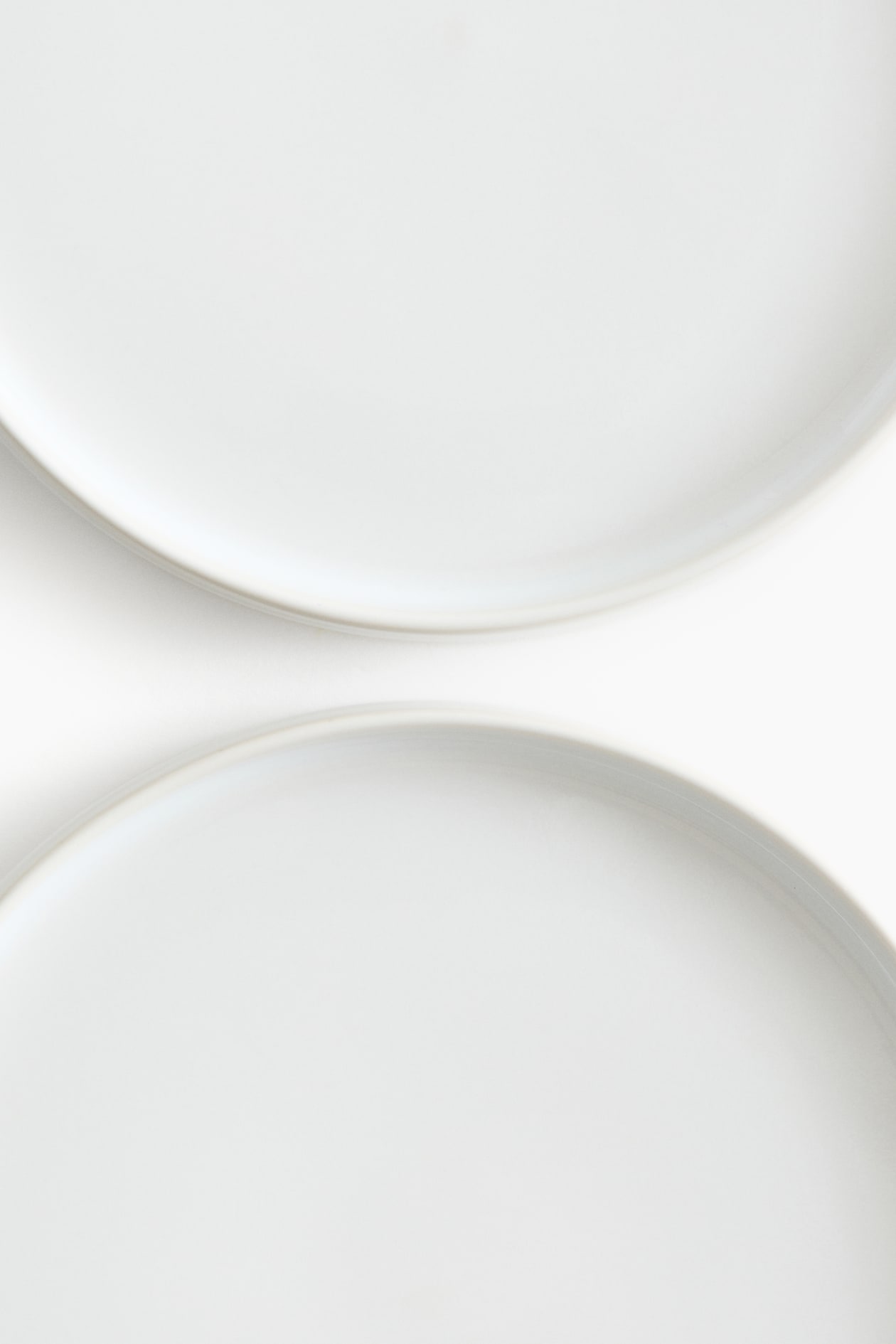 White 2-Pack Medium-Sized Stoneware Plates at H&M Home | H&M US