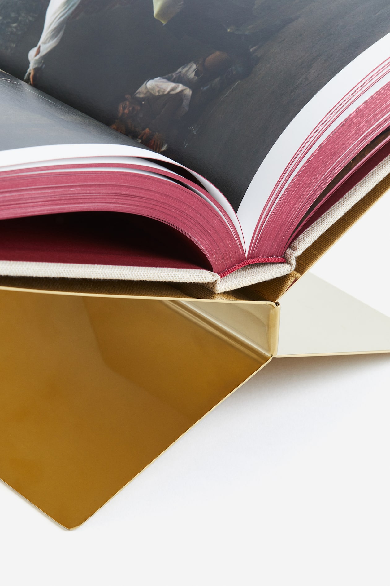 Gold-coloured Metal book stand at H&M Home | H&M GB