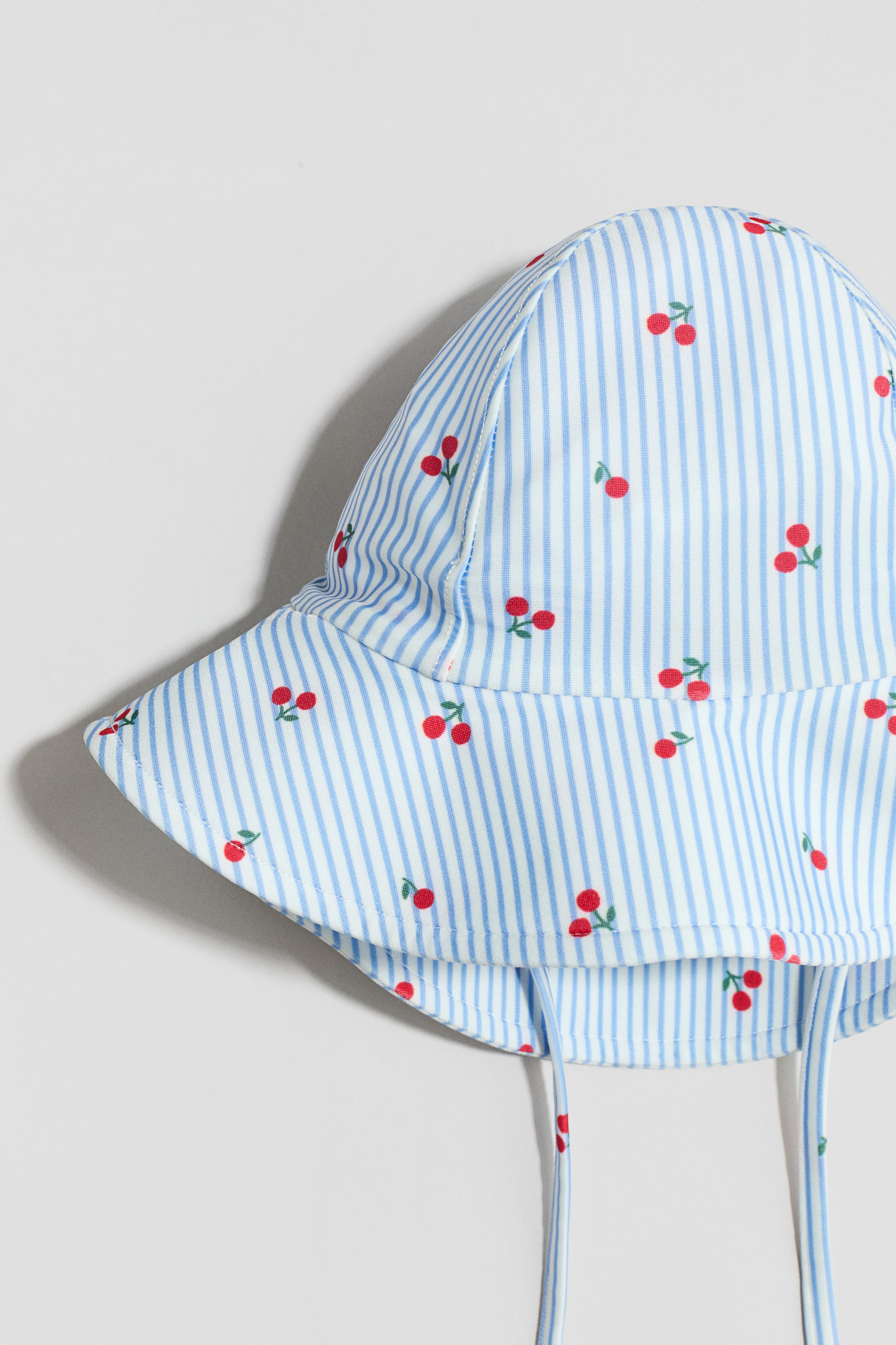 UPF 50 sun hat - Light blue/Cherries - Kids | H&M MY