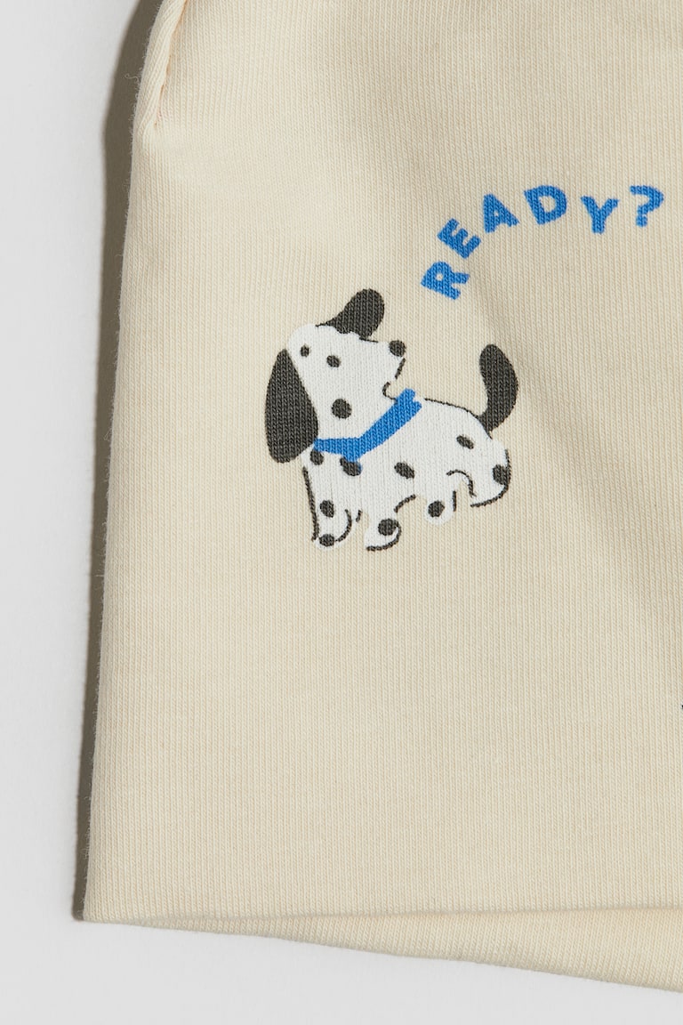Light beige/dogs Cotton Jersey Beanie for kids | H&M US