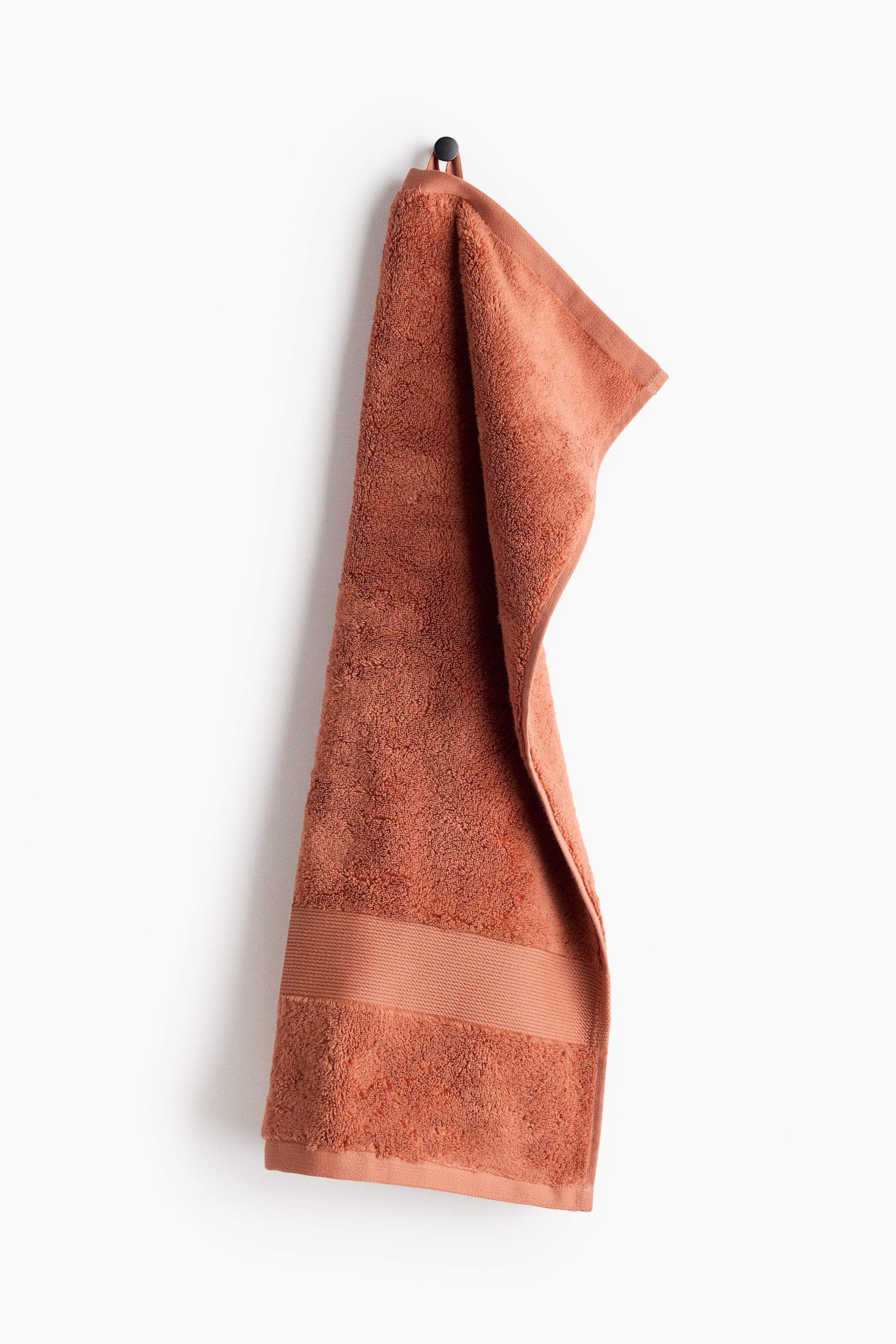 Soft terry hand towel - Rust red - Home All | H&M IN
