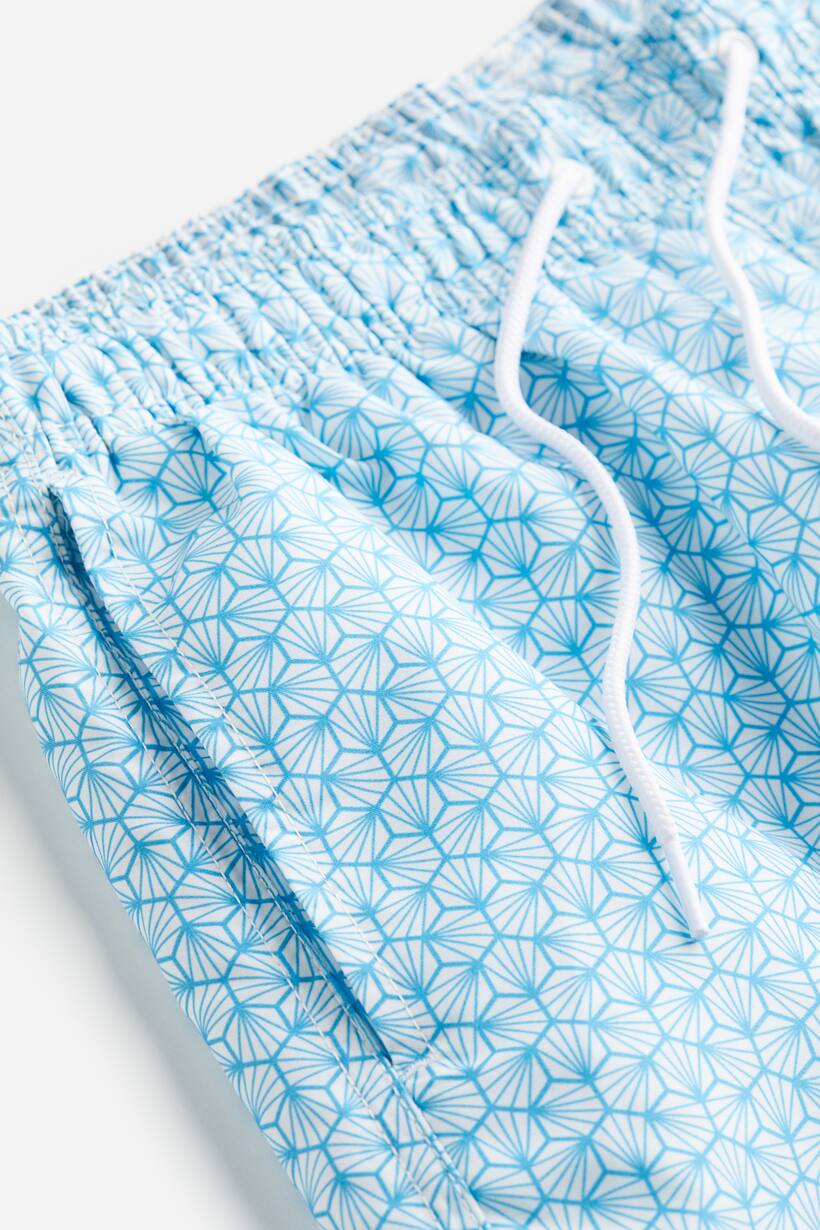 Men’s Light blue/patterned Patterned Swim Shorts | H&M US
