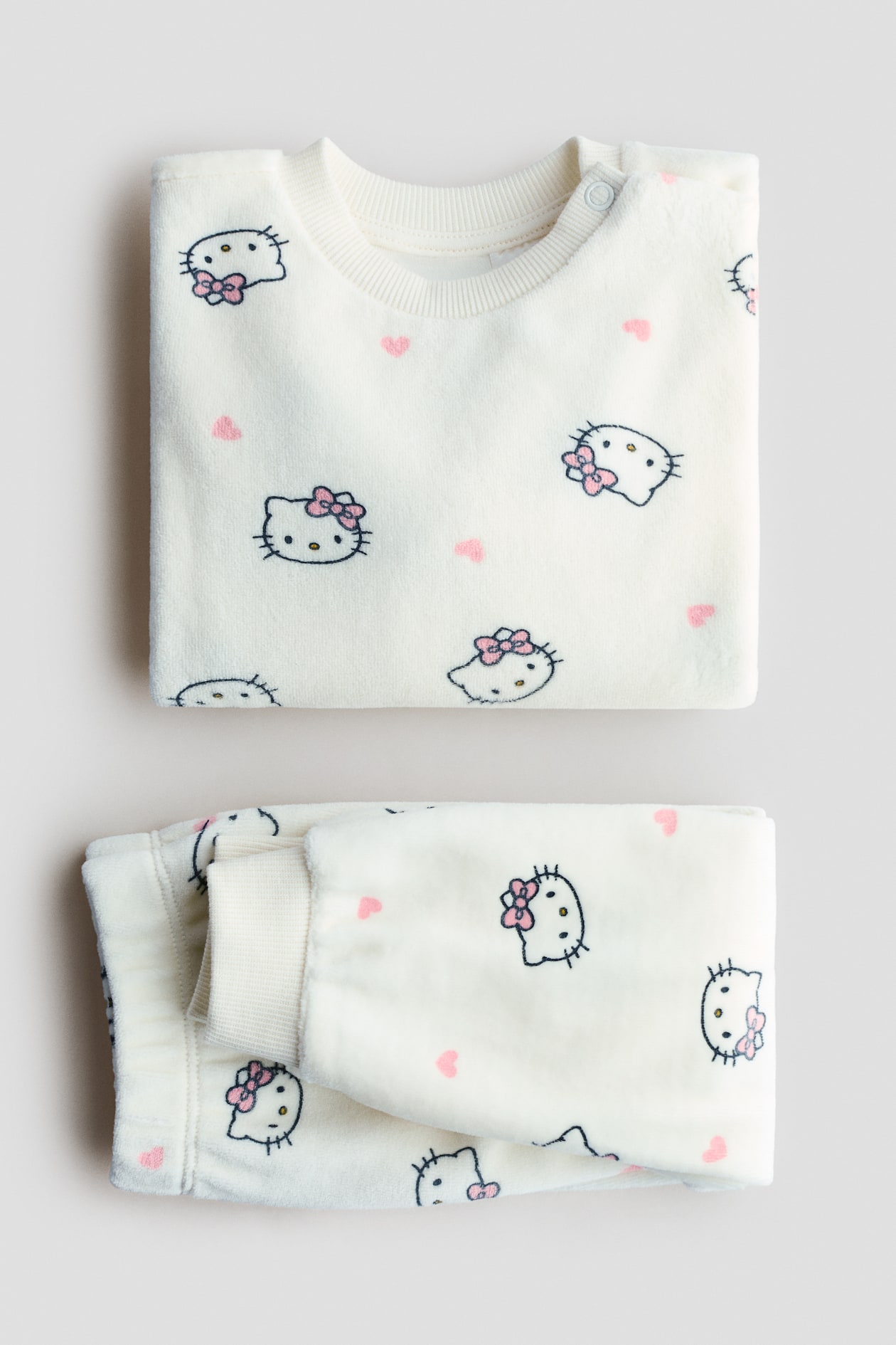 White/Hello Kitty Patterned velour pyjamas for kids | H&M GB