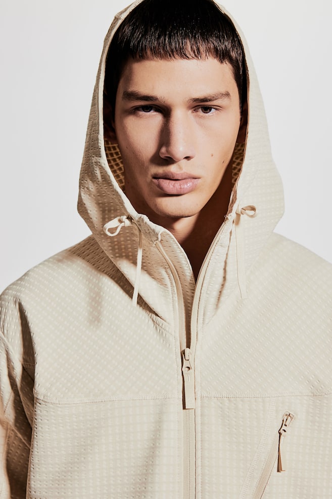 Regular Fit Mid layer jacket with DryMove™ - Light beige - Men | H&M IN