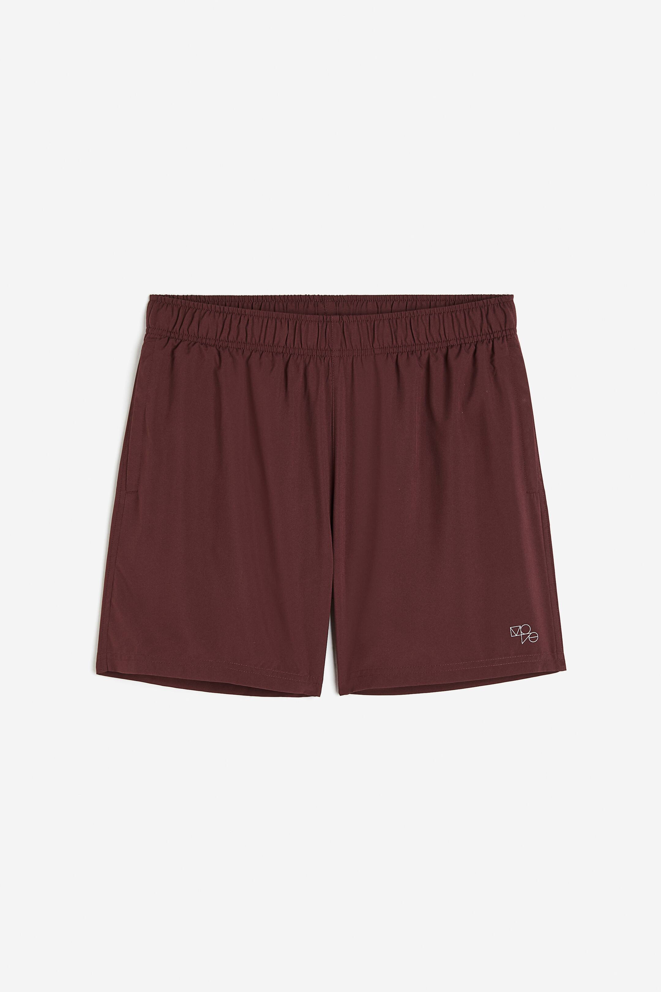 Mid-length sports shorts with DryMove™ - Rust red - Men | H&M HK