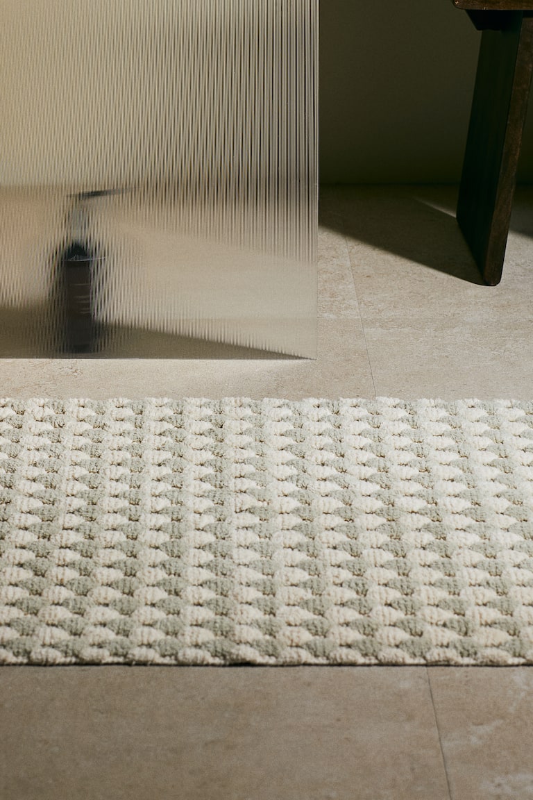 Light dusty green/dotted Patterned Cotton Bath Mat at H&M Home | H&M US
