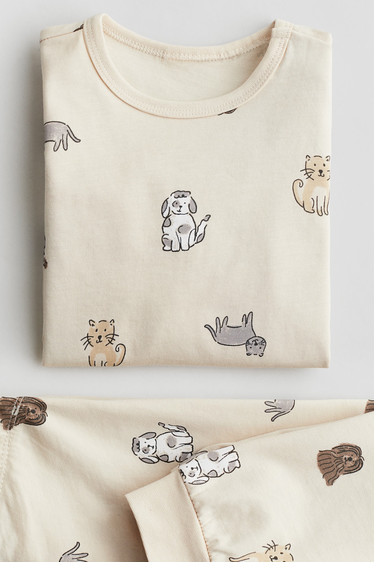 Printed cotton pyjamas - Light beige/Dogs - Kids | H&M GB